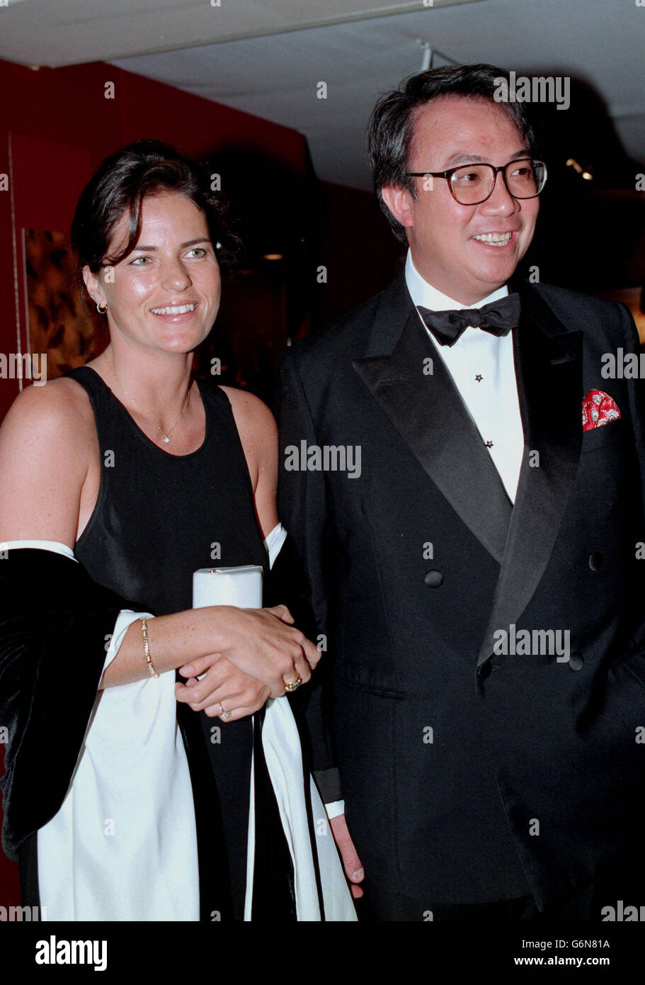 Co-chairman of the charity gala evening, David Tang, and his fiancee at ...