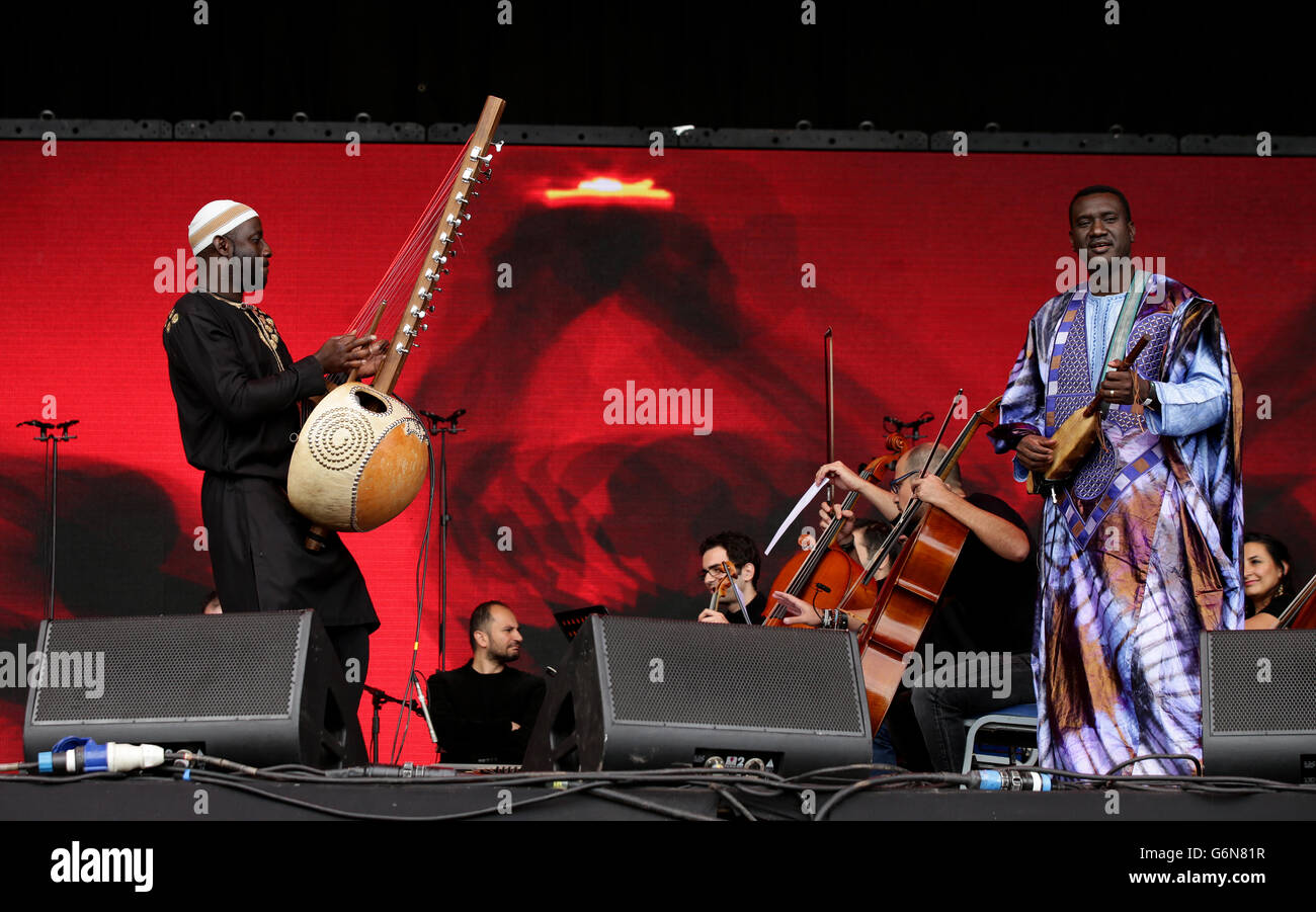 The Orchestra of Syrian Musicians performing on The Pyramid Stage at ...
