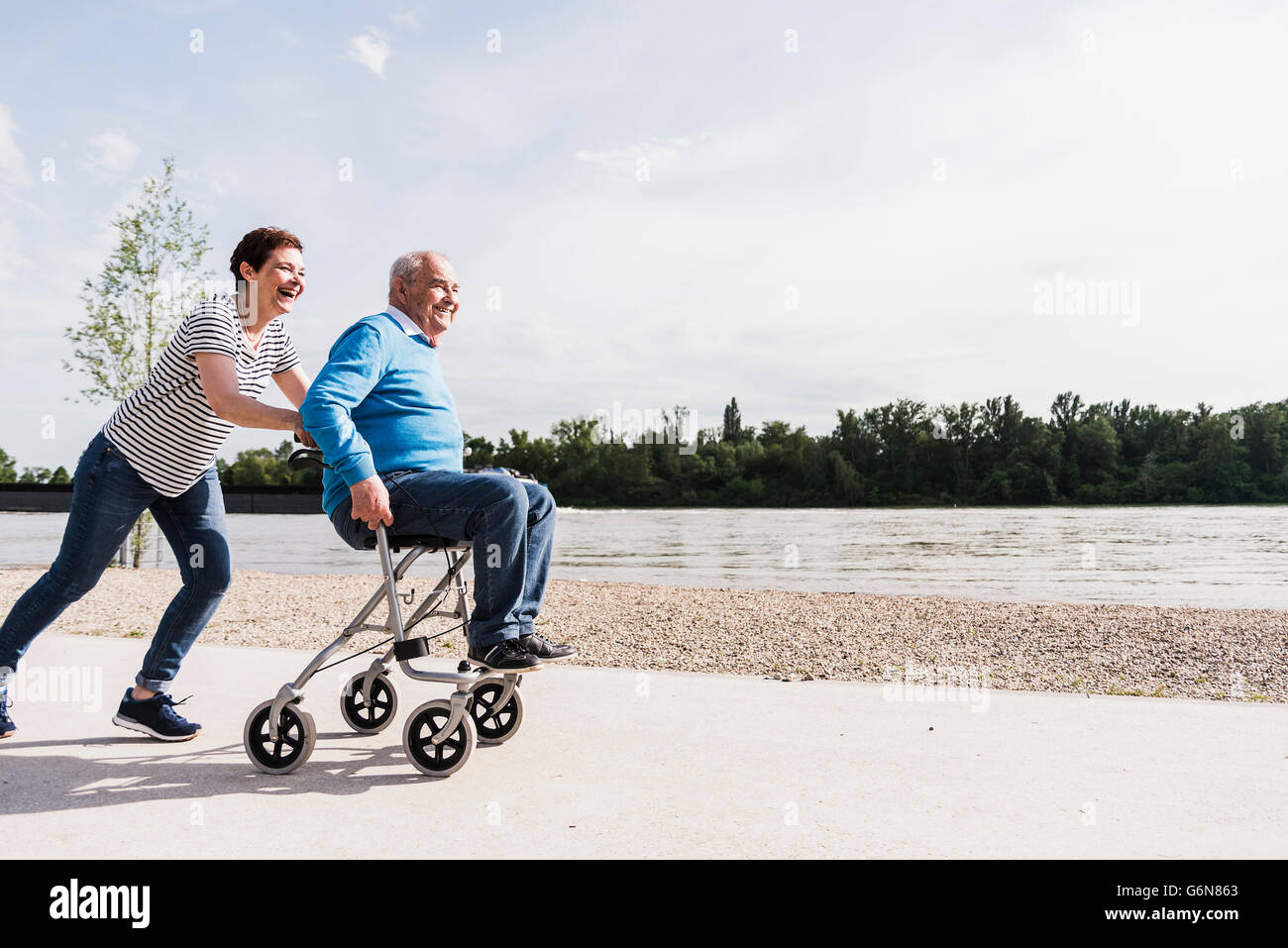 Old man sitting on walker hi-res stock photography and images - Alamy