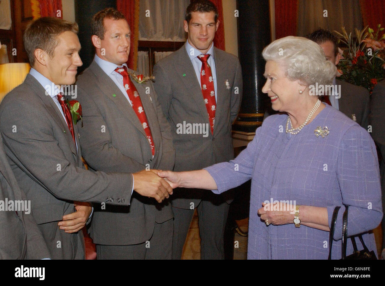 Britain's Queen Elizabeth II with England Rugby stars Jonny Wilkinson ...