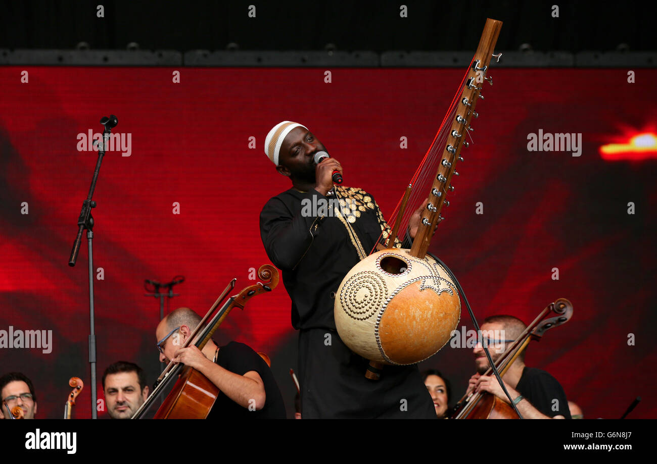 The Orchestra of Syrian Musicians performing with Damon Albarn on the ...
