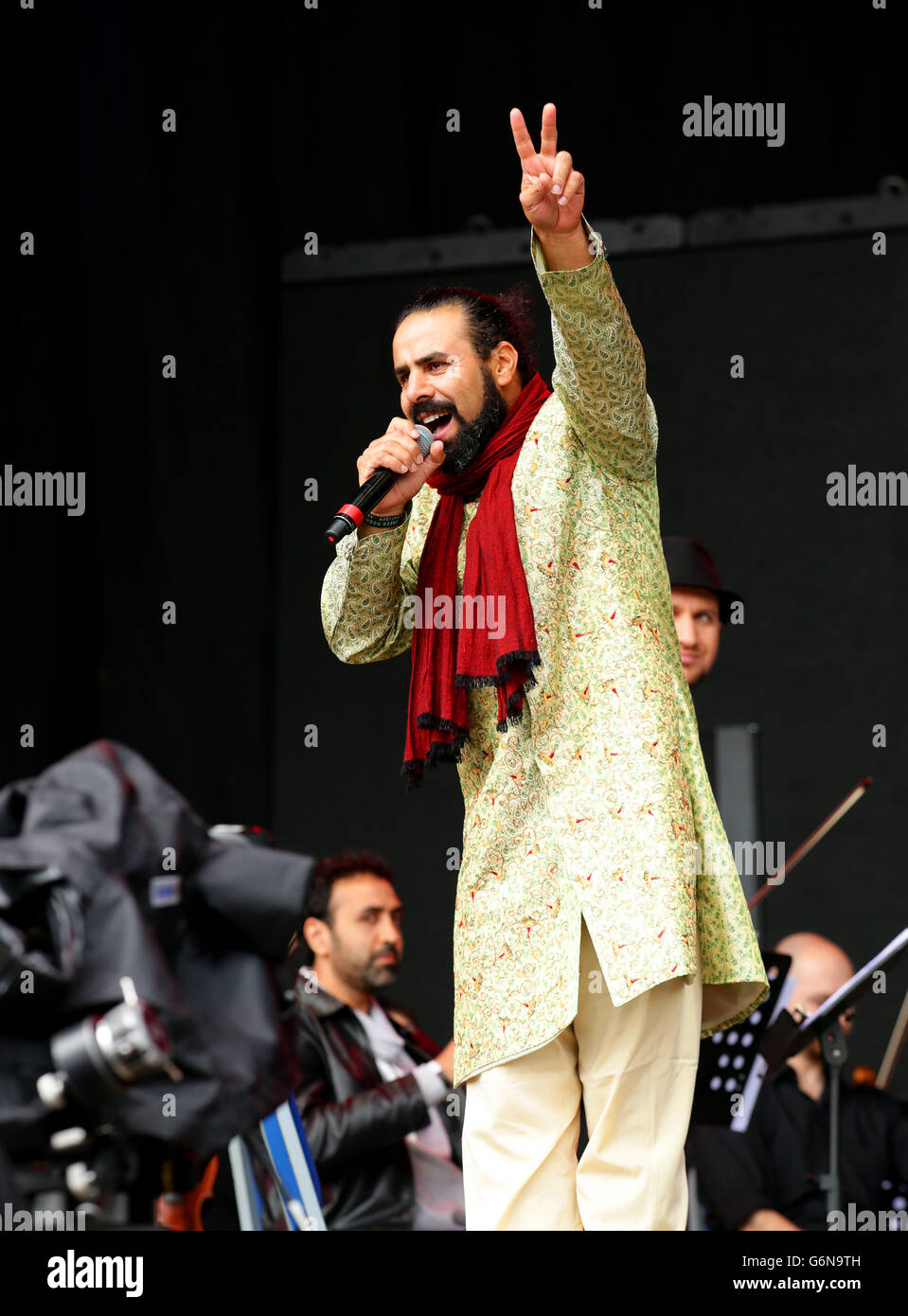 The Orchestra of Syrian Musicians performing on The Pyramid Stage at ...