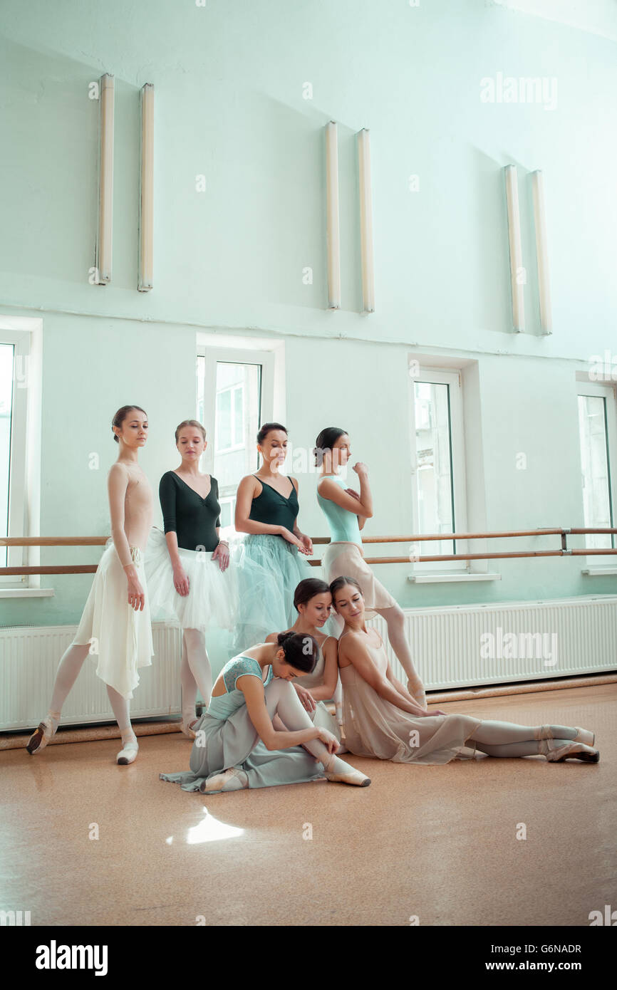 The seven ballerinas at ballet bar Stock Photo - Alamy