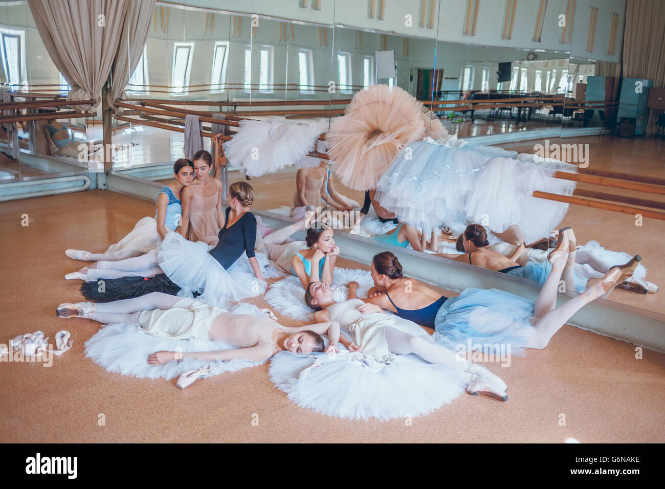 The seven ballerinas against ballet bar Stock Photo - Alamy