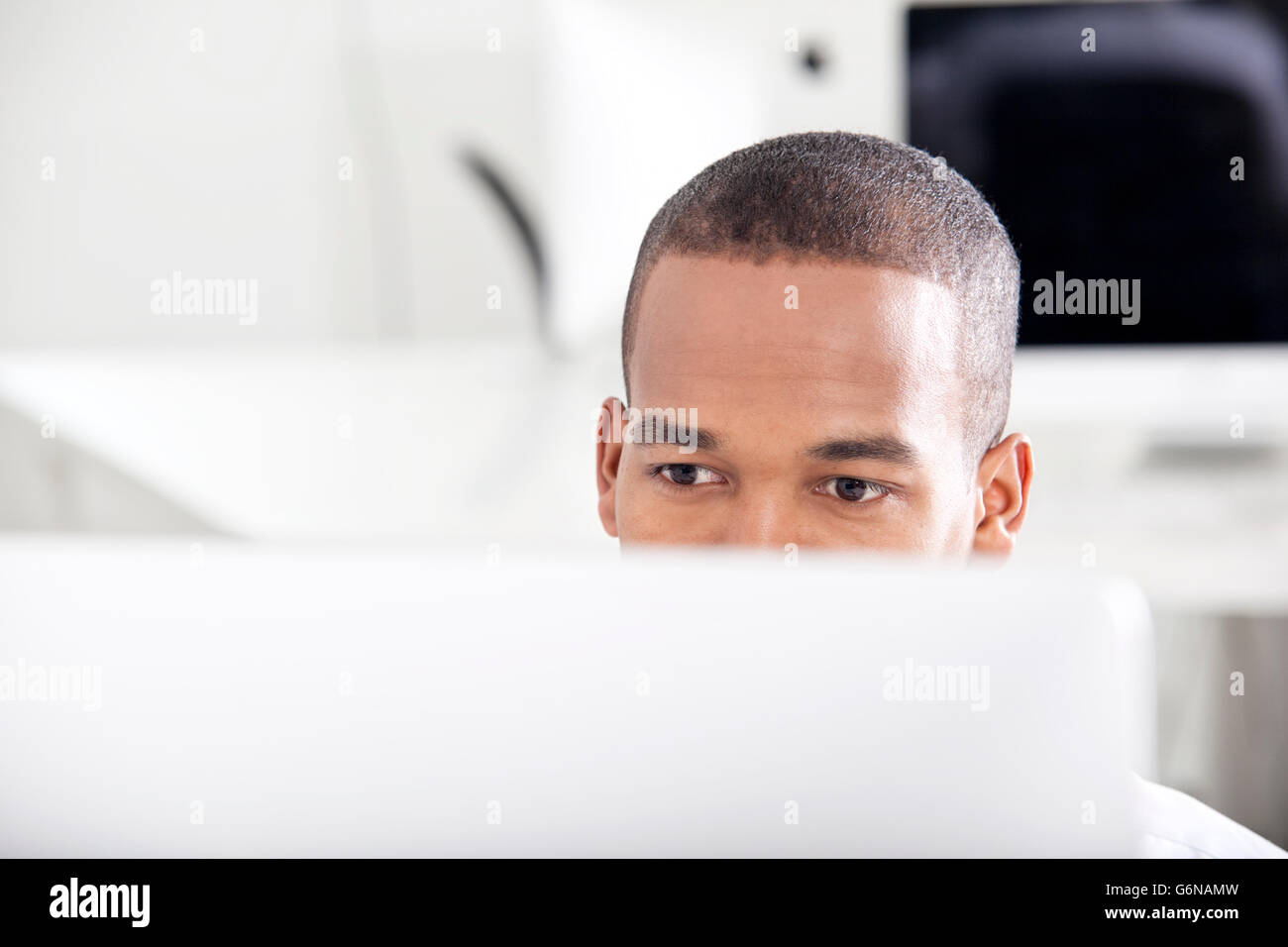 Man behind his computer Stock Photo - Alamy