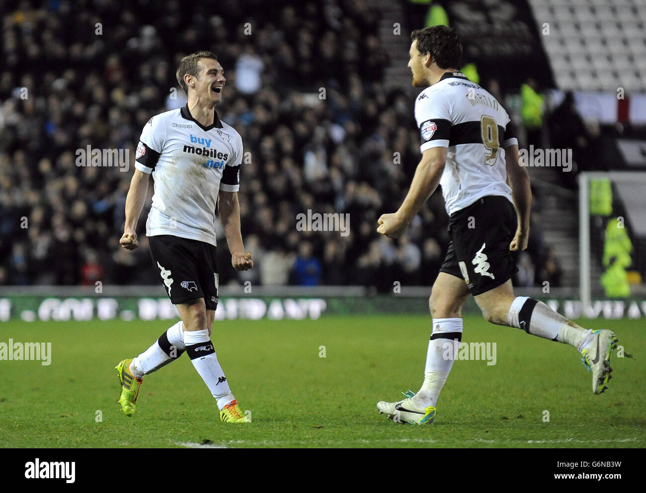 Derby County's Craig Bryson (left) celebrates with Chris Martin (right ...