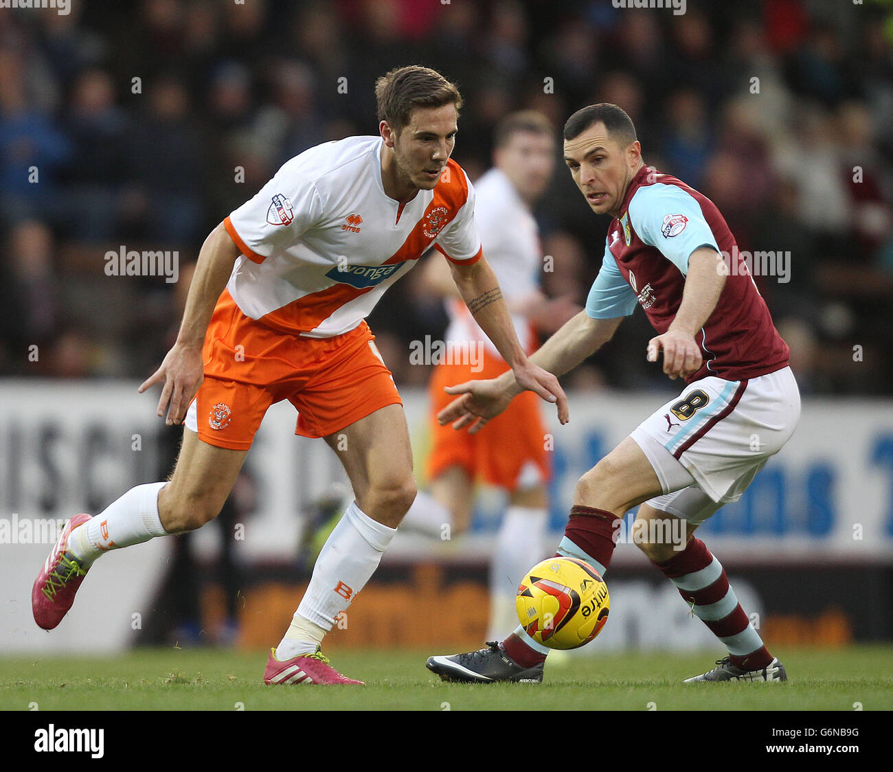 Blackpools dan gosling left burnleys dean battle for the ball hi-res ...