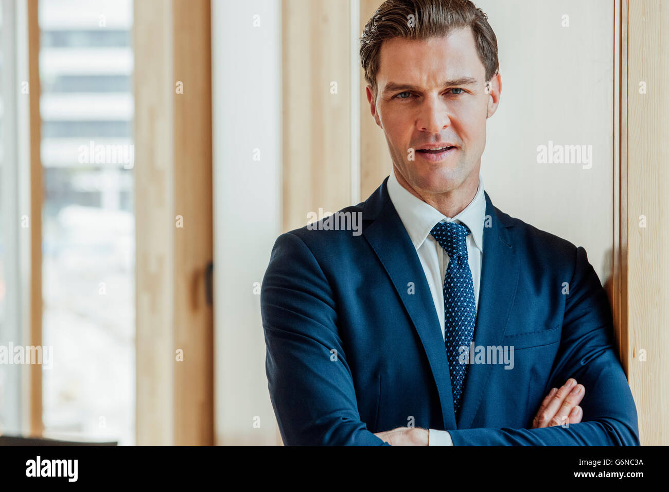 Portrait of confident businessman Stock Photo - Alamy