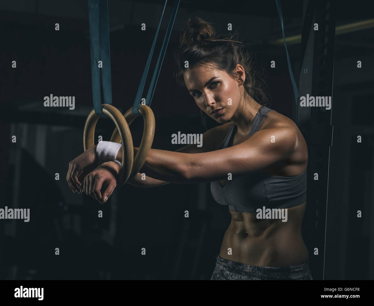 Female athlete, gymnastic rings Stock Photo - Alamy