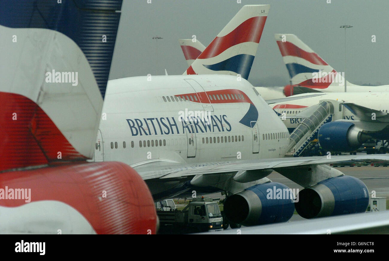 British Airways aircraft on the tarmac at Heathrow Airport's Terminal 4 ...