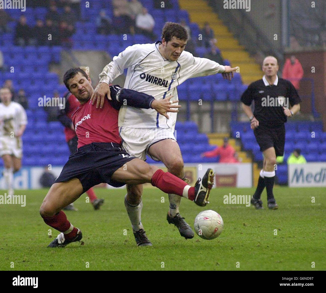 Bolton's Emerson Thome (L) challenges Tranmere's Simon Howarth during ...