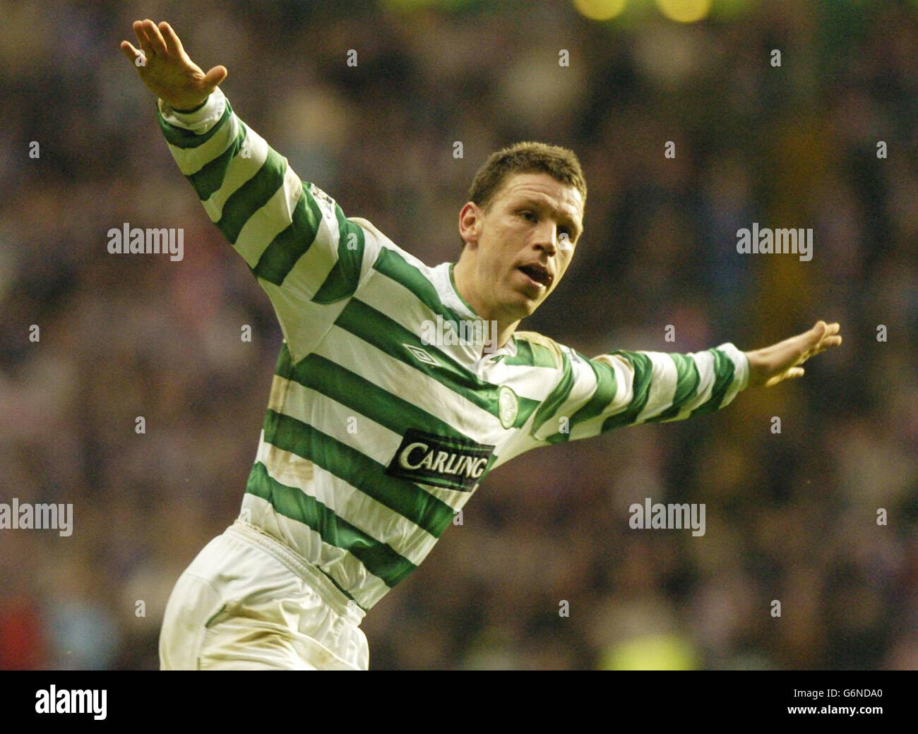 Sport football celebrating arms raised alan thompson hi-res stock ...