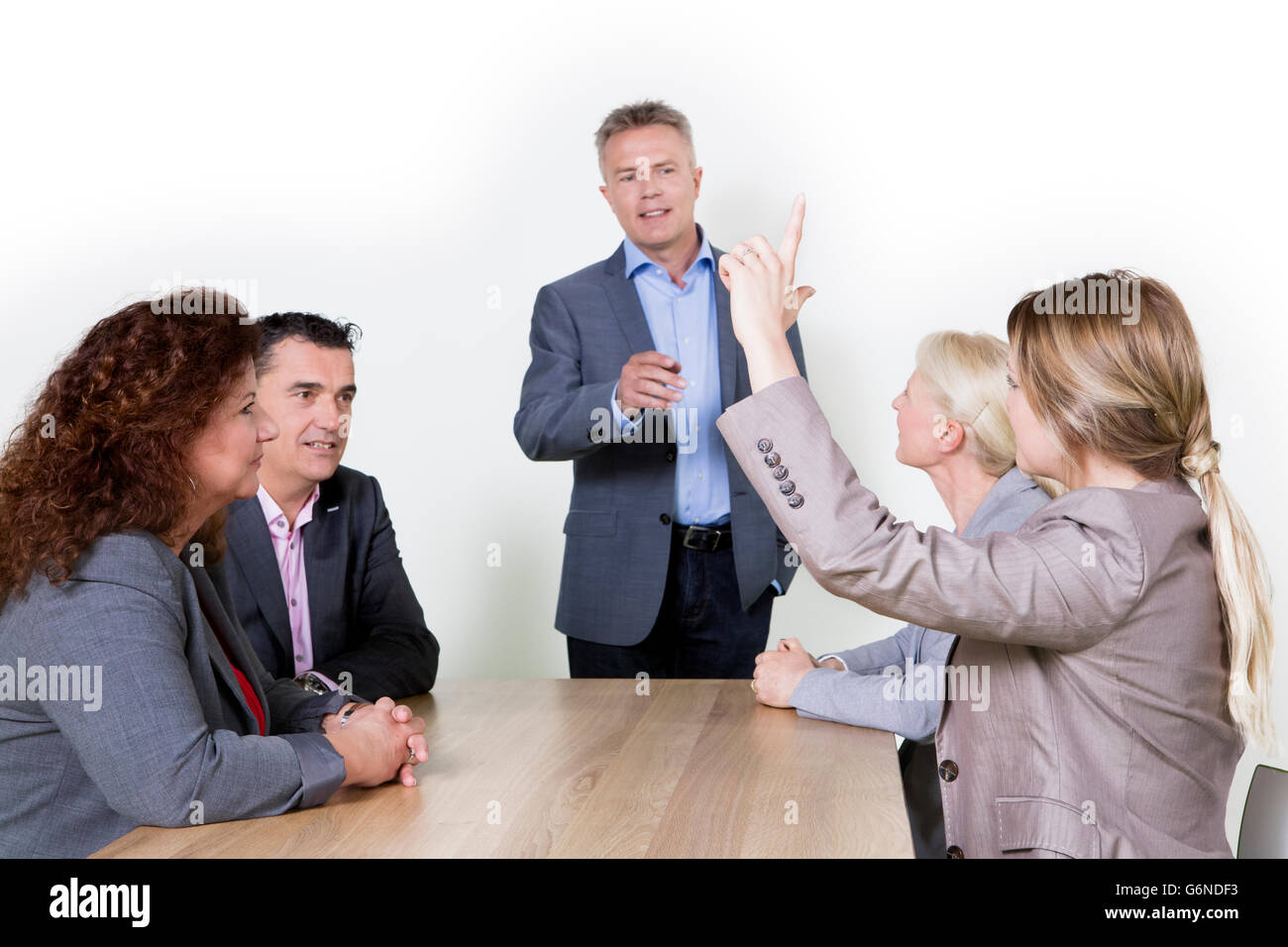 Business presentation in a conference room, a business person standing ...