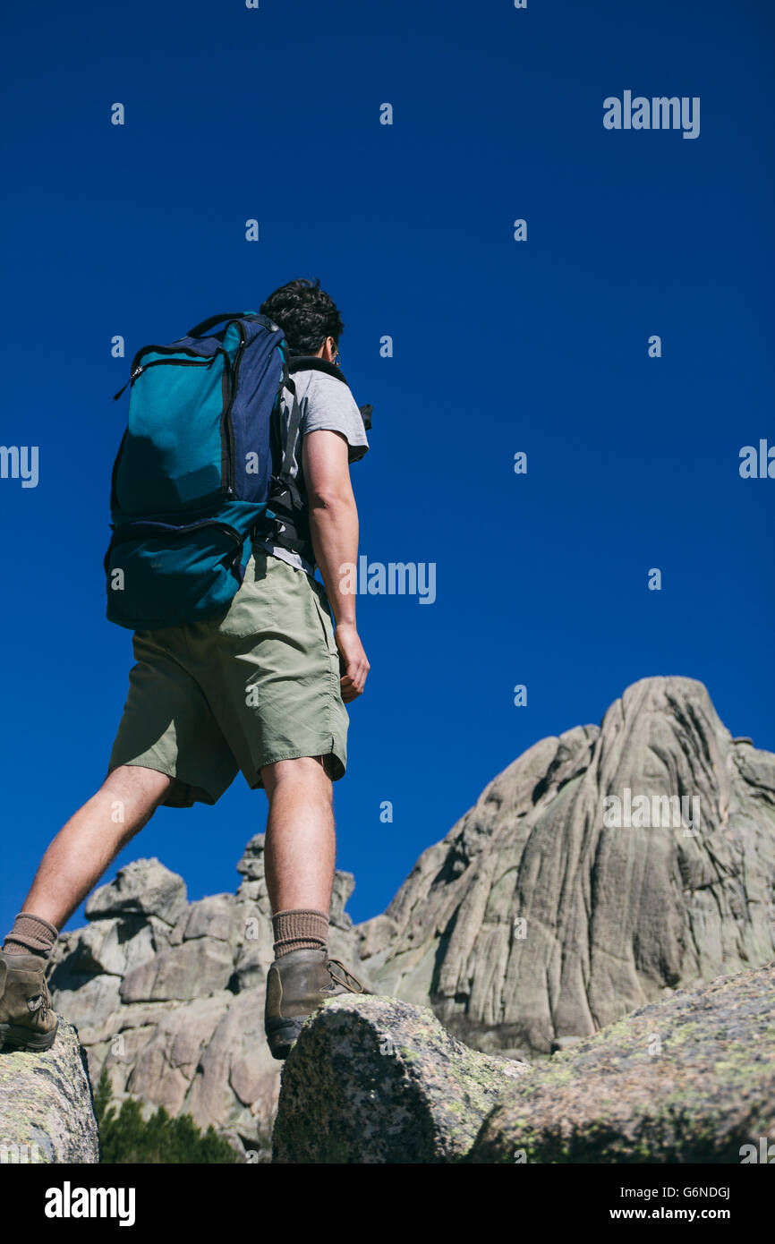 Spain, hiker with a backpack in Regional Park La Pedriza Stock Photo ...