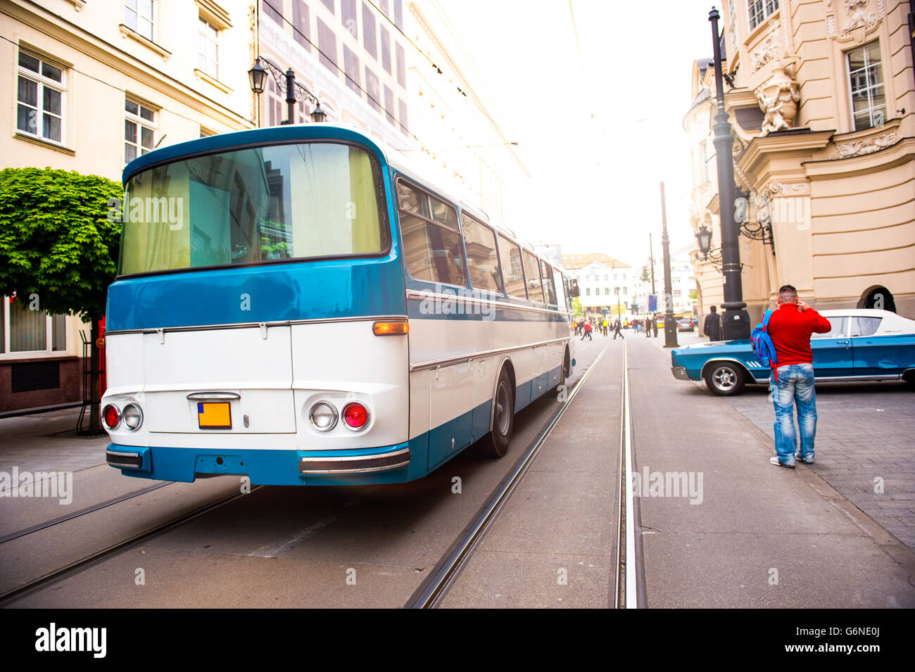 Veteran bus on street cruise on public roads, rear view Stock Photo - Alamy