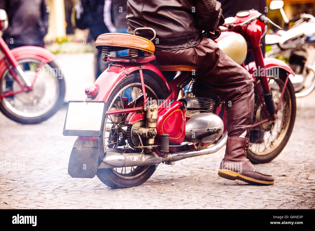 Old man riding motorcycle hi-res stock photography and images - Alamy