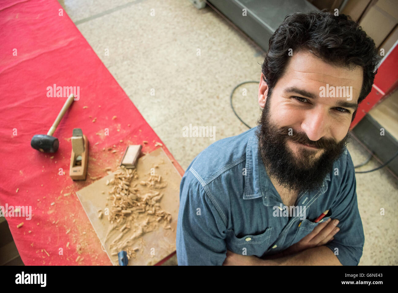 Portrait of carpenter smiling Stock Photo - Alamy