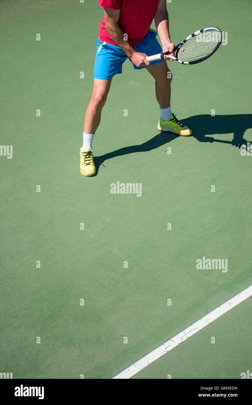 Legs of tennis player Stock Photo - Alamy