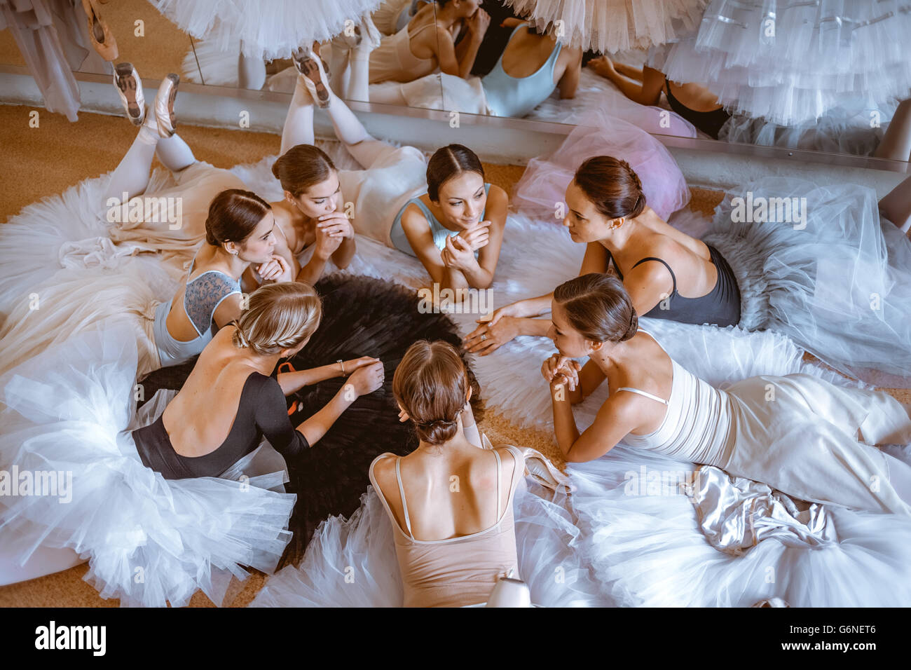 The seven ballerinas against ballet bar Stock Photo - Alamy