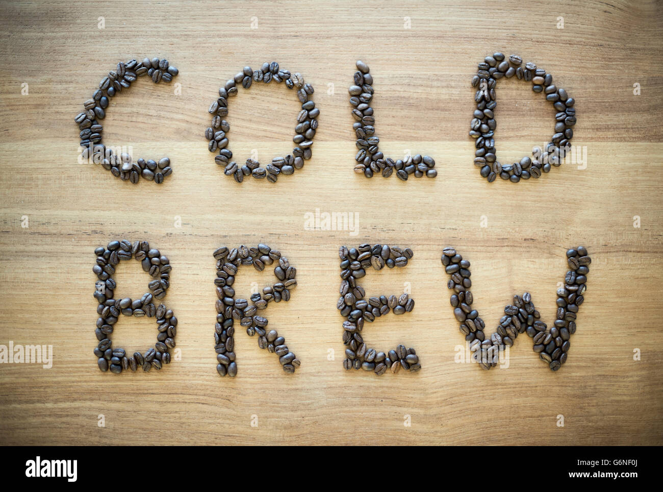 cold brew sign by roasted coffee beans Stock Photo - Alamy