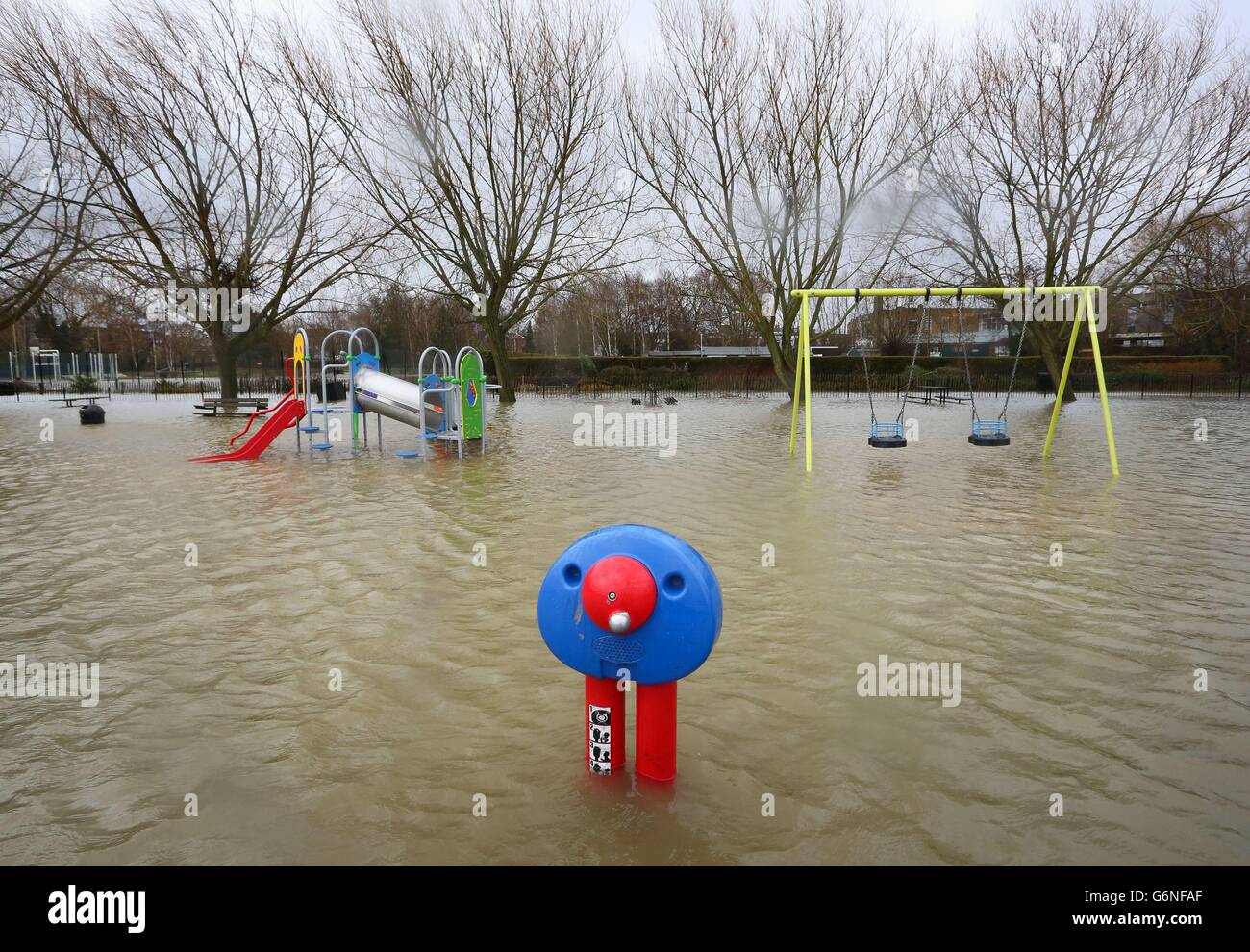 A children's play park remains covered by flood waters on the ...