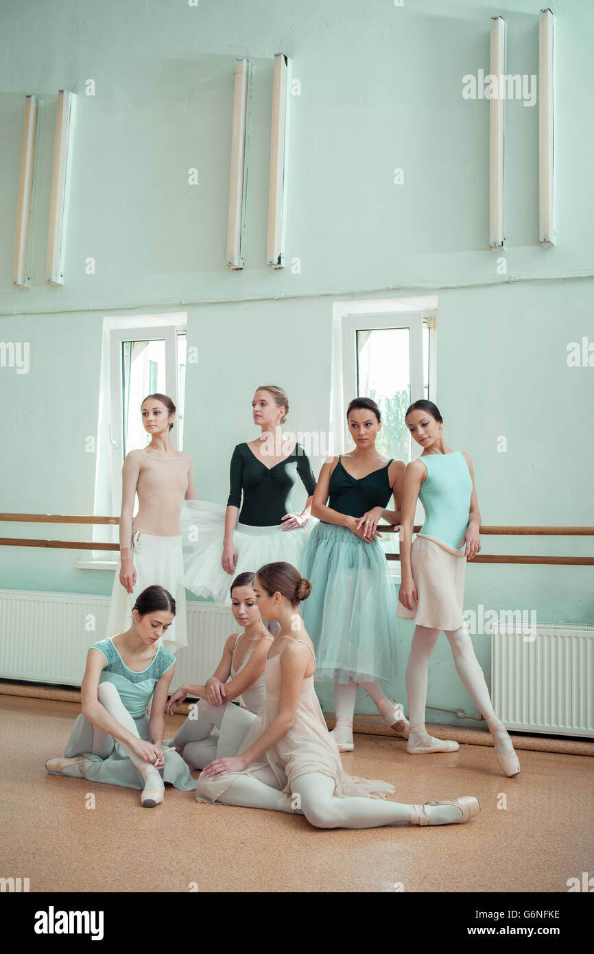The seven ballerinas at ballet bar Stock Photo - Alamy