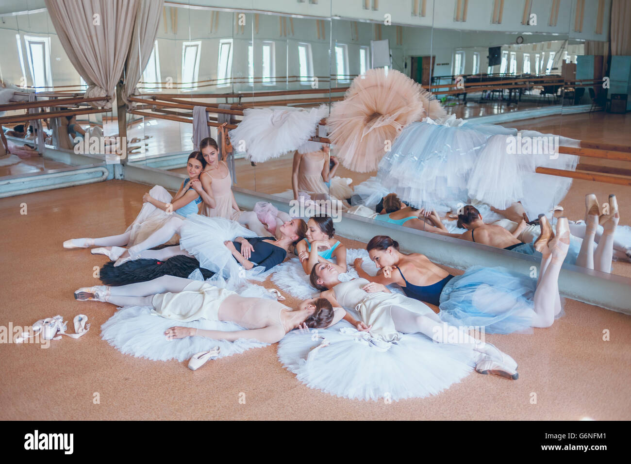 The seven ballerinas against ballet bar Stock Photo - Alamy
