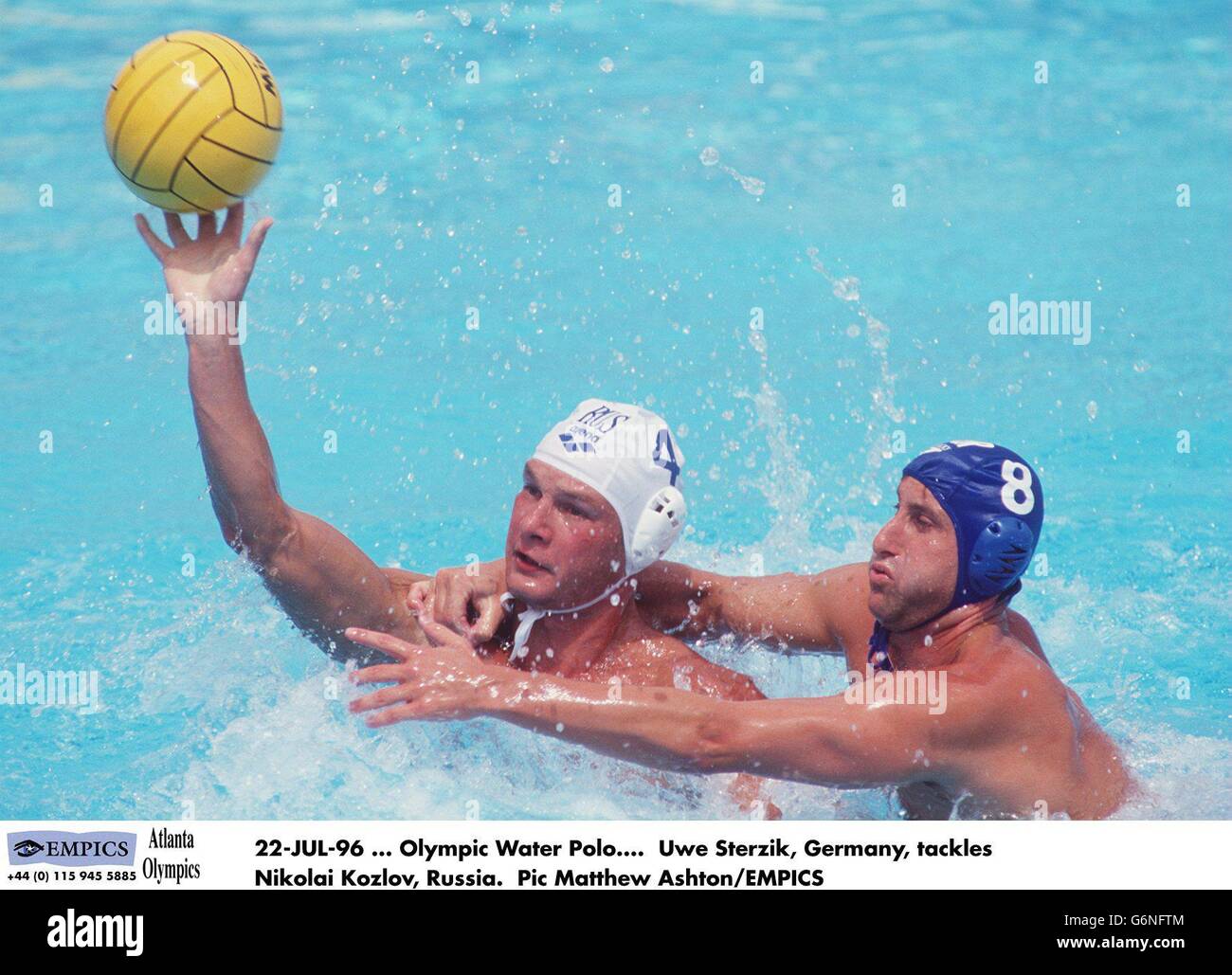 22-JUL-96. Olympic Water Polo. Uwe Sterzik, Germany, tackles Nikolai ...