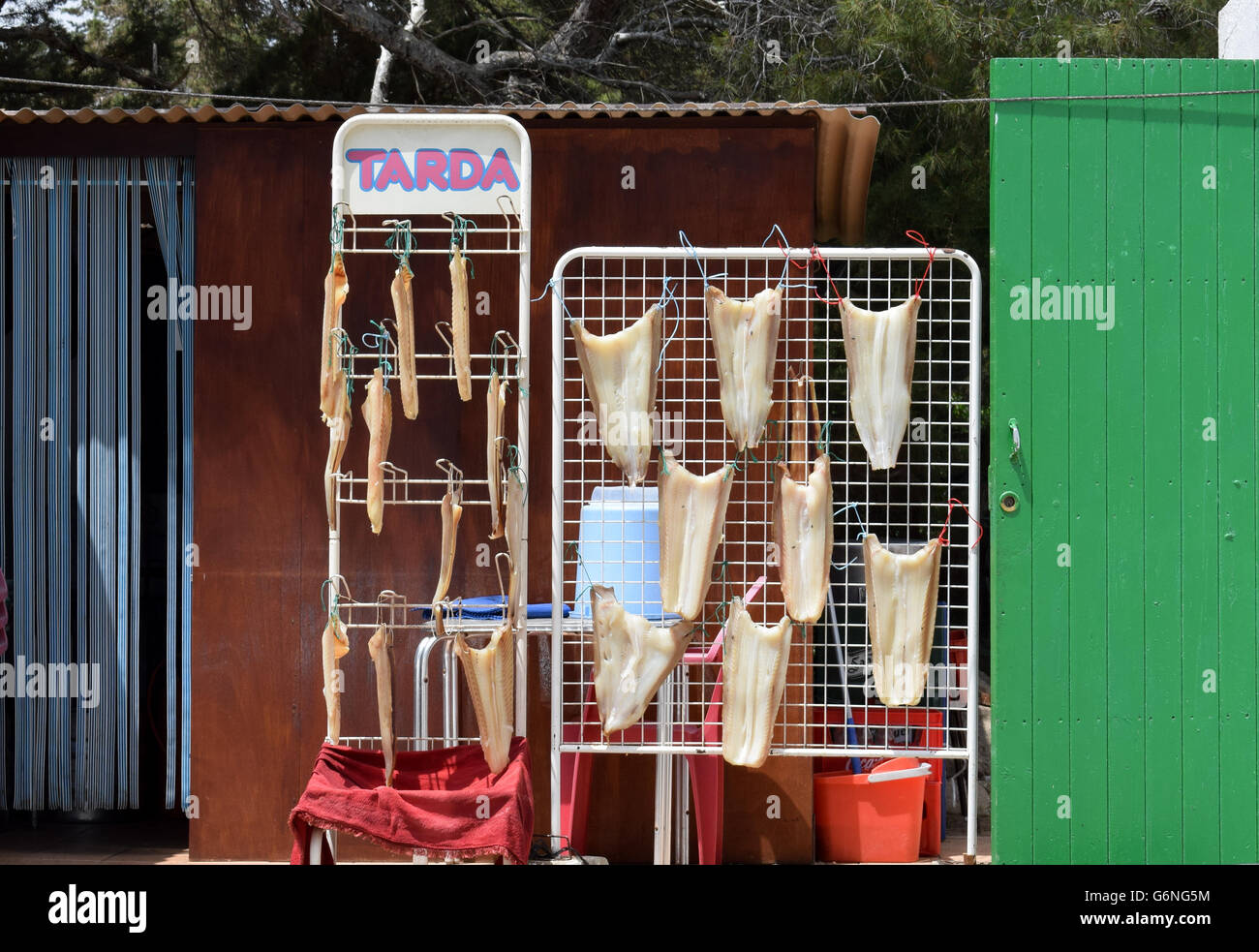 Fillets of fish drying in the sun, Formentera Stock Photo - Alamy