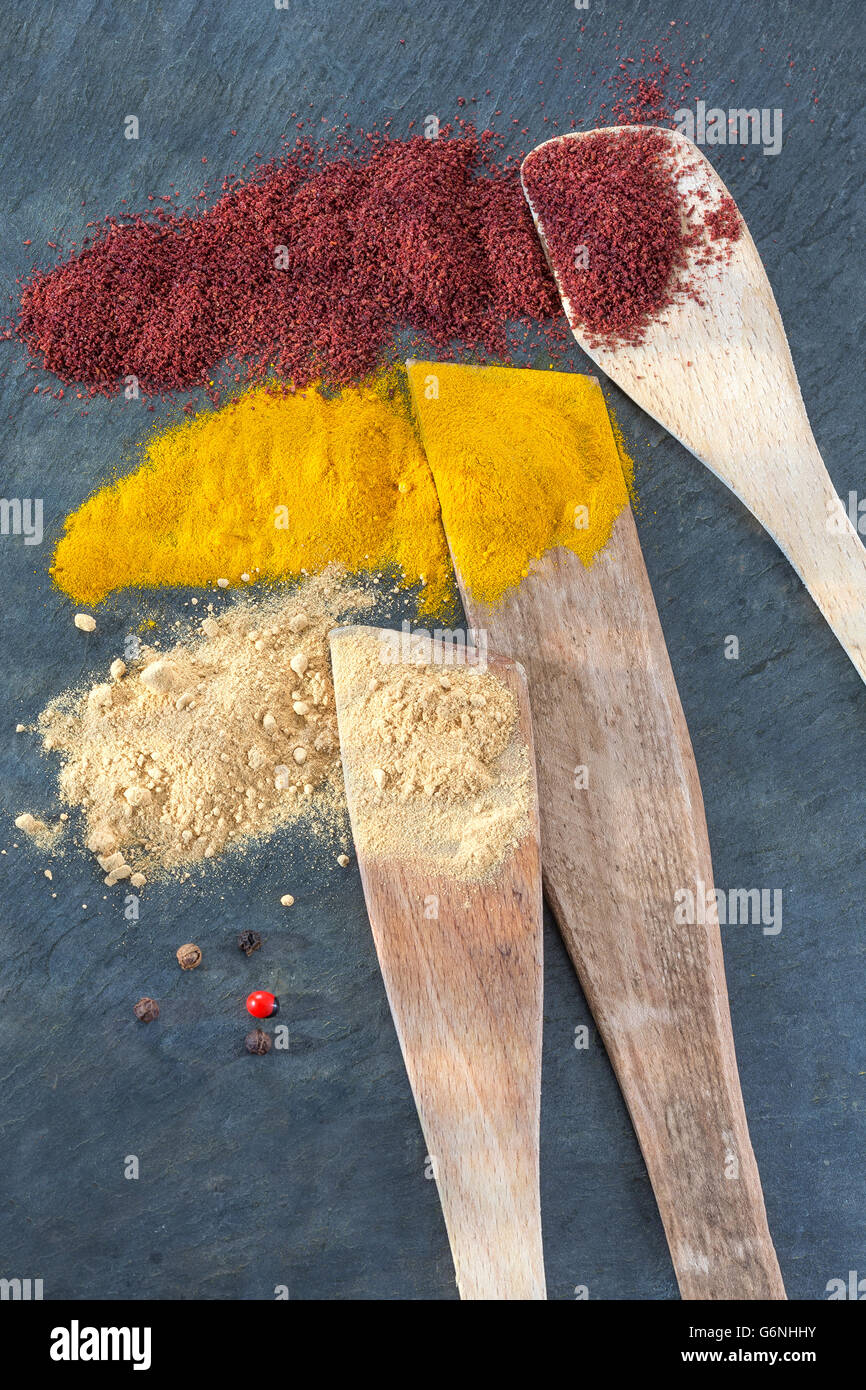Assortment of powder spices on spoons Stock Photo - Alamy