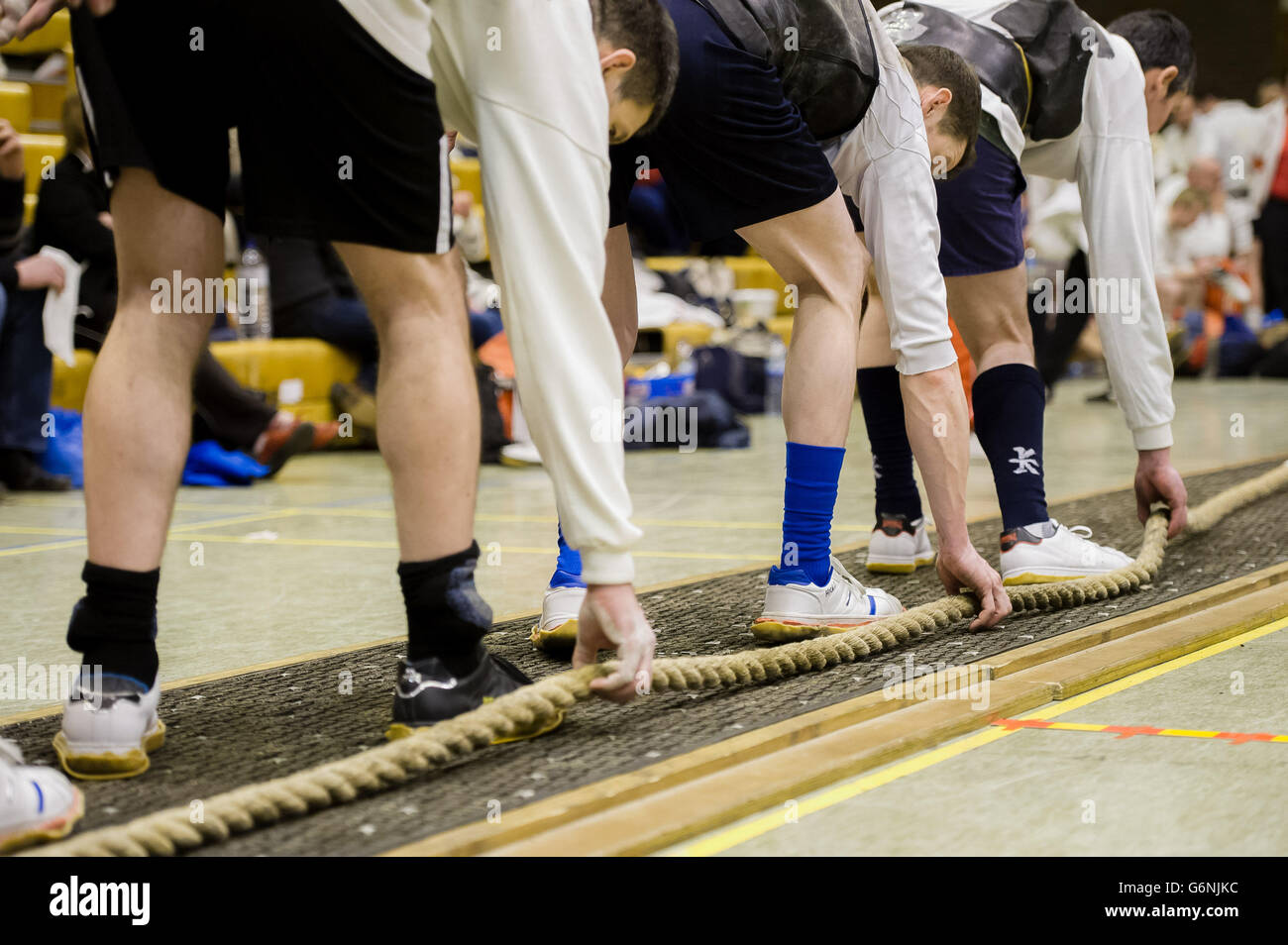 A team from Northern Ireland pick up the rope as they prepare to ...