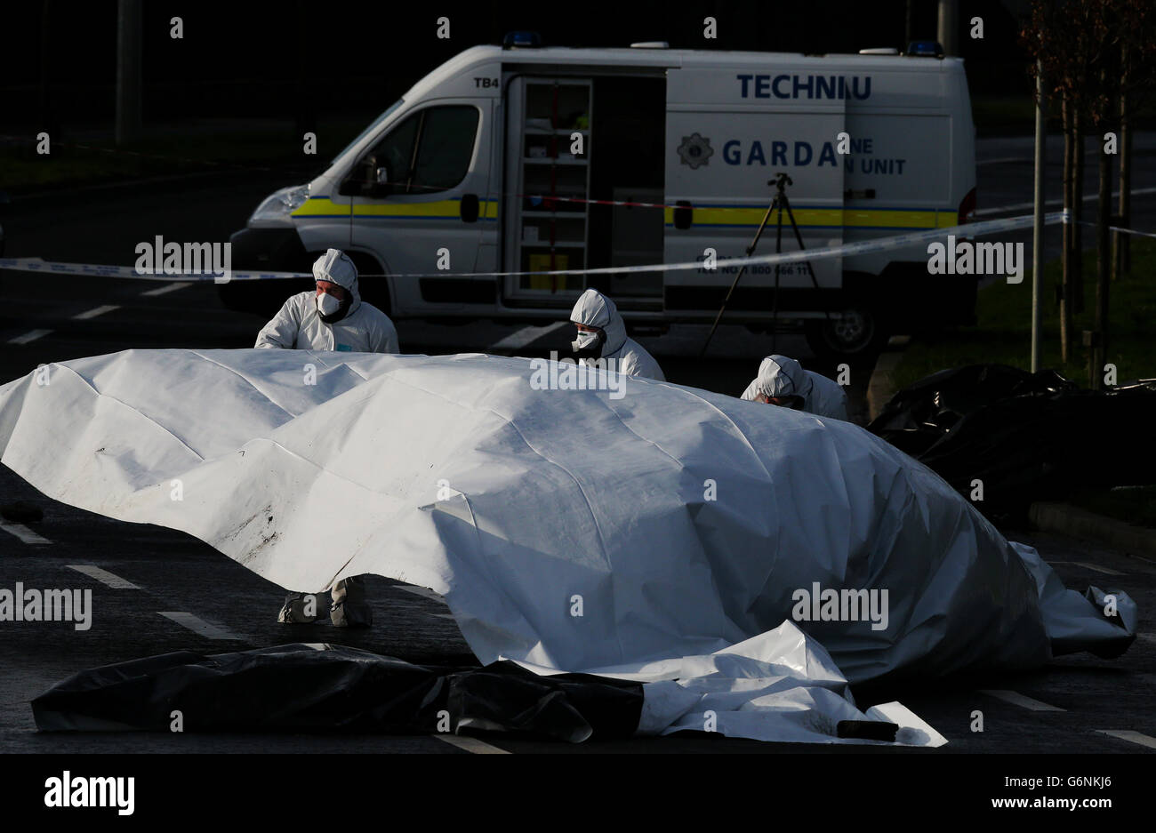 Members of the Garda Technical Bureau at a crime scene on the ...