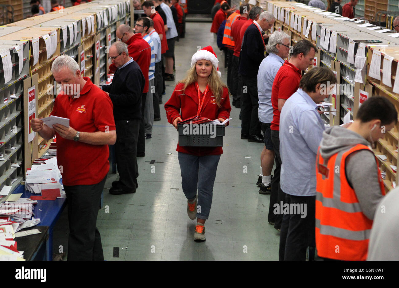 Royal Mail employee Emma Hope, with Christmas post at Glasgow Mail ...