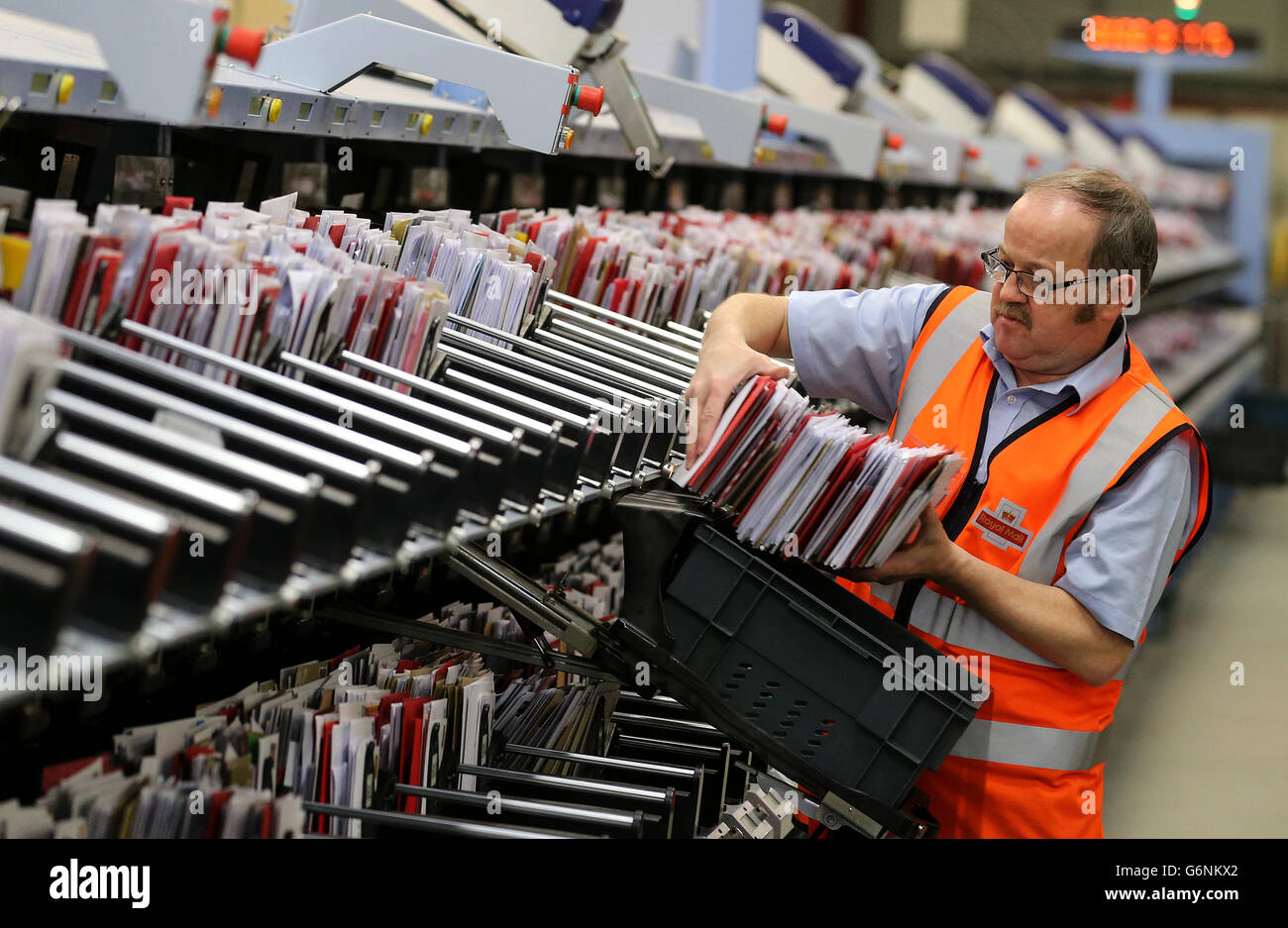 Royal Mail employee Hamish Graham, with Christmas post at Glasgow Mail ...