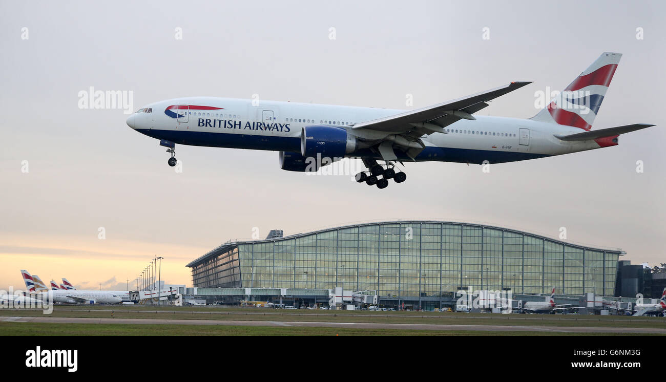 Planes land at Heathrow Airport as extra runways at Heathrow and Gatwick are among the options ...
