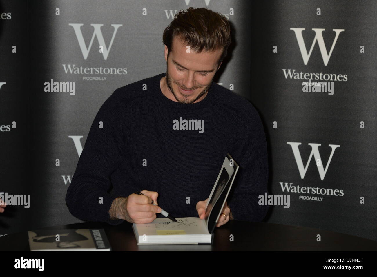 Footballer David Beckham signs copies of his new self titled book at ...
