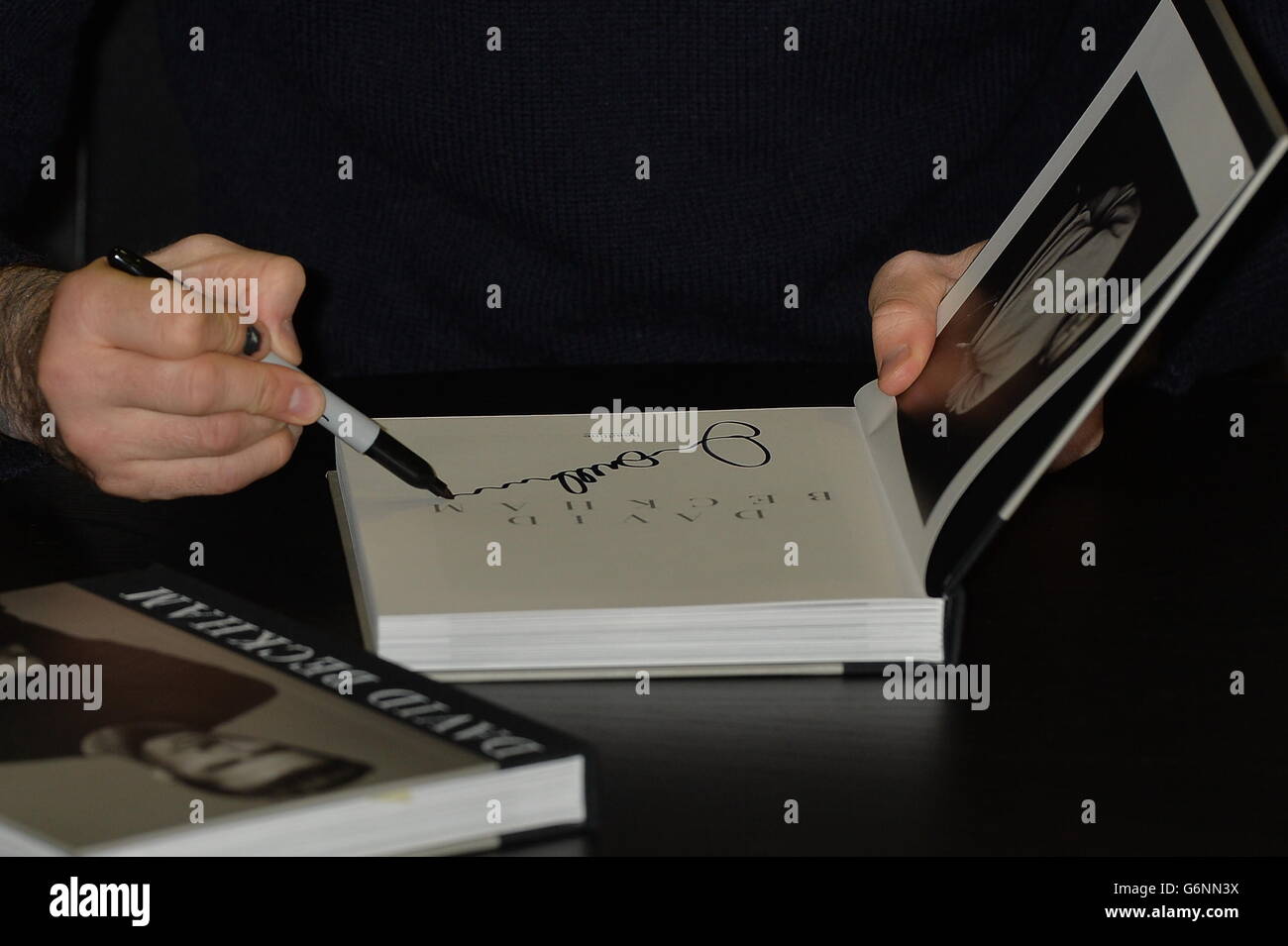 Footballer David Beckham signs copies of his new self titled book at ...