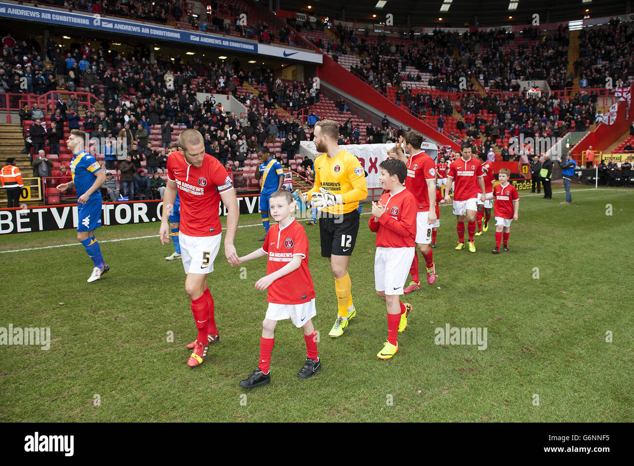 Charlton Athletic Captain Michael Morrison leads the players and ...