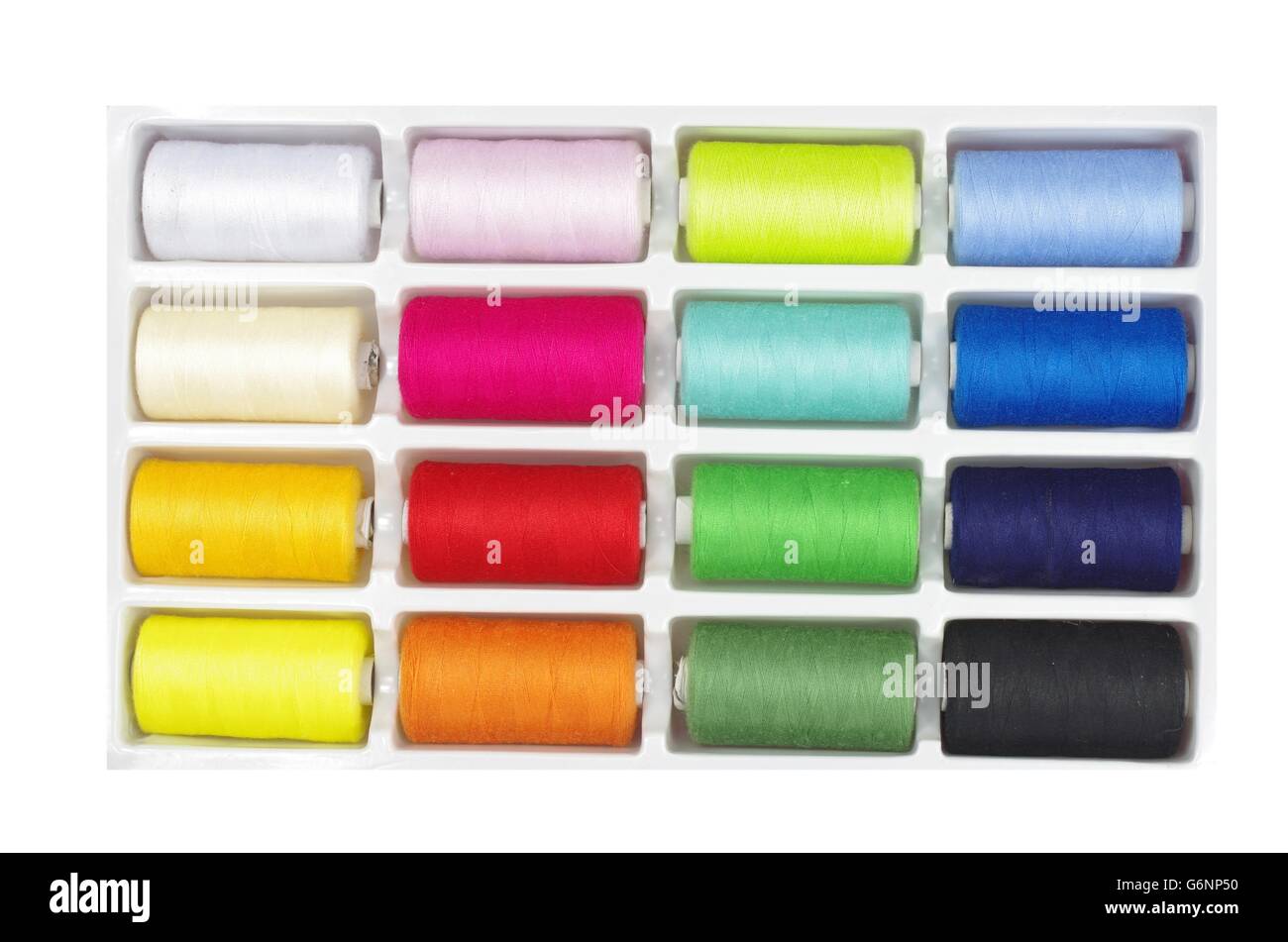 colourful threads in box on white background Stock Photo - Alamy