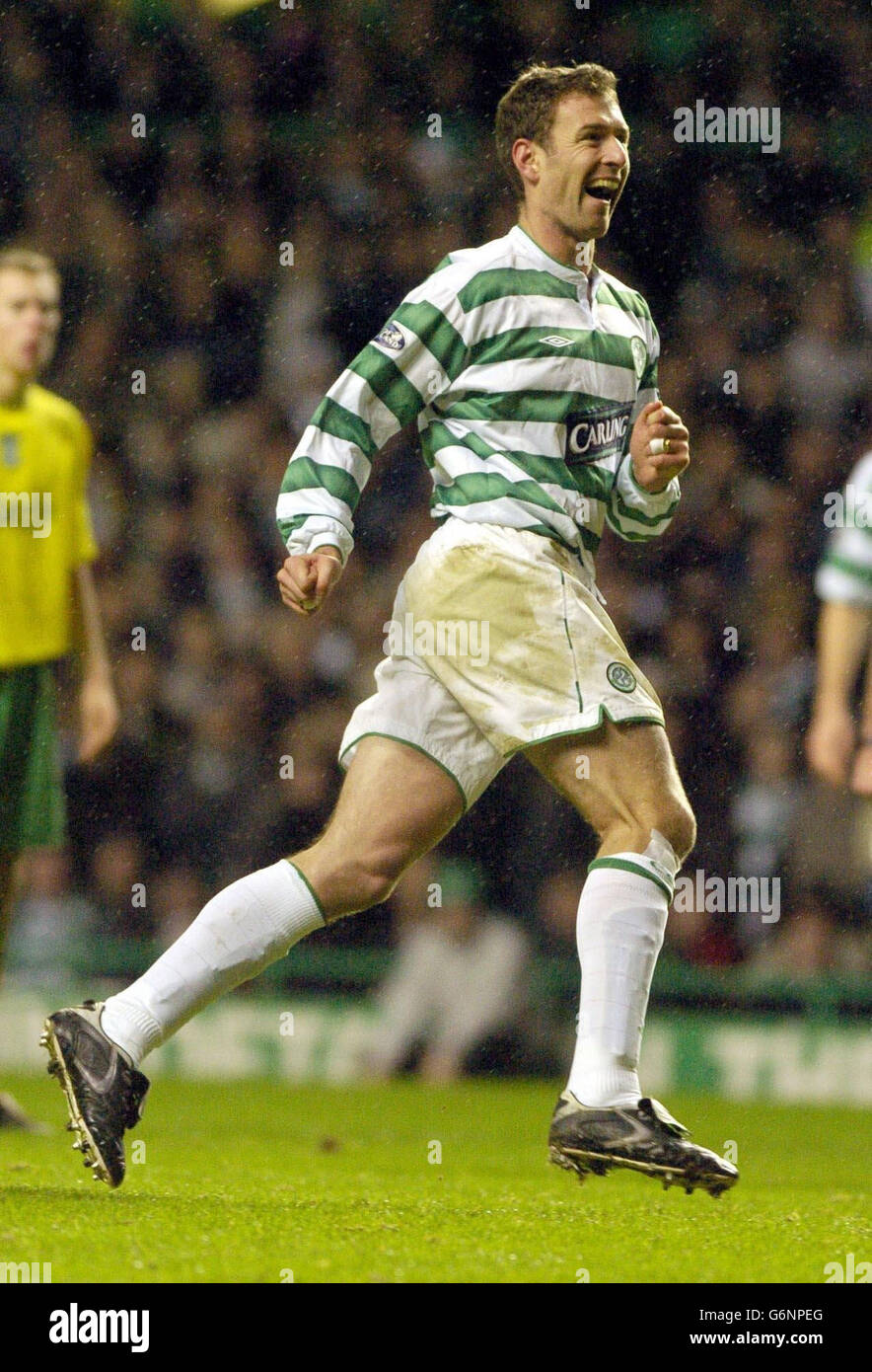 Celtic's Chris Sutton celebrates scoring from the penalty spot against ...