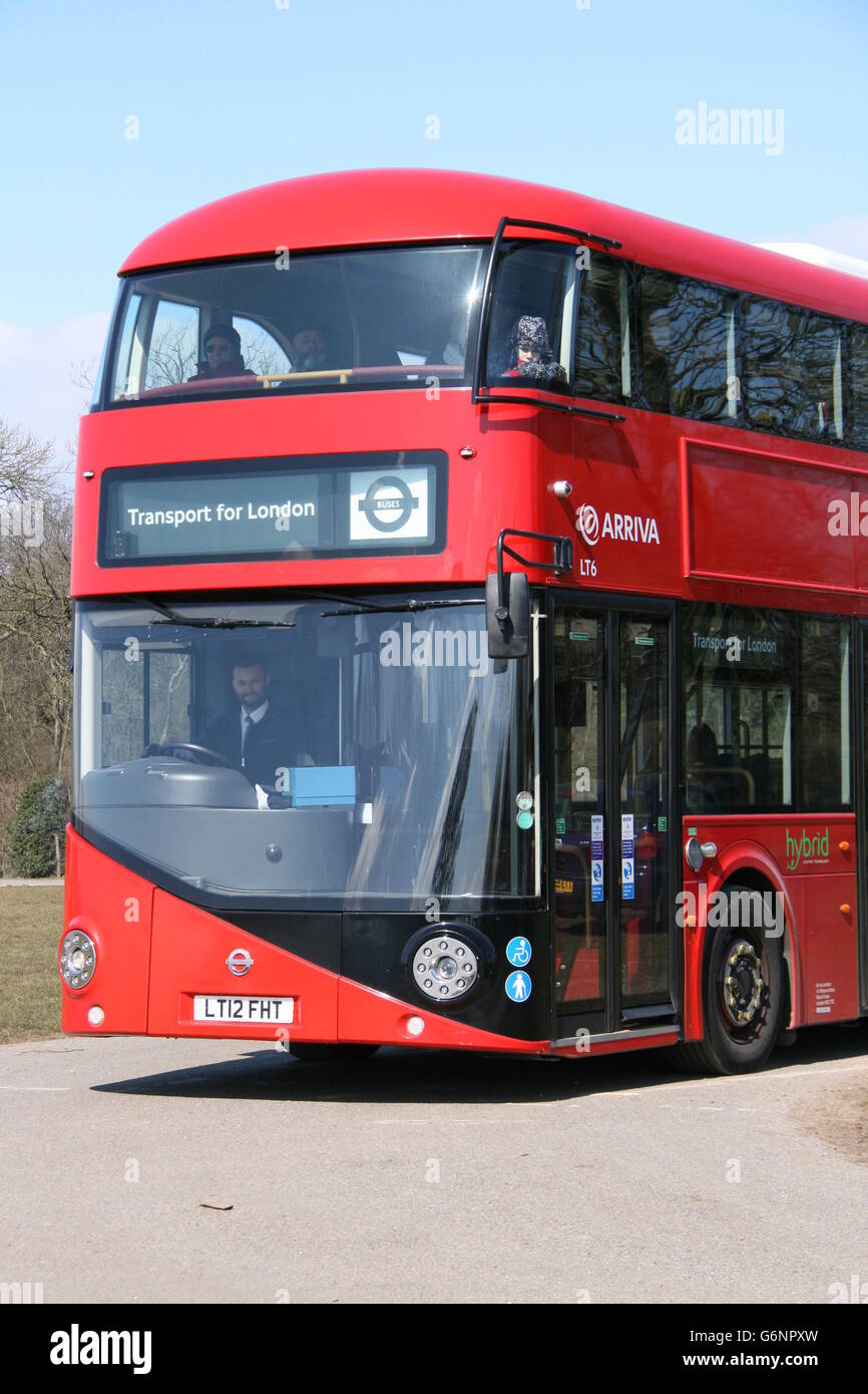 A PORTRAIT-SIZE PHOTO OF THE FRONT OF A RED LONDON NEW ROUTEMASTER BUS ...