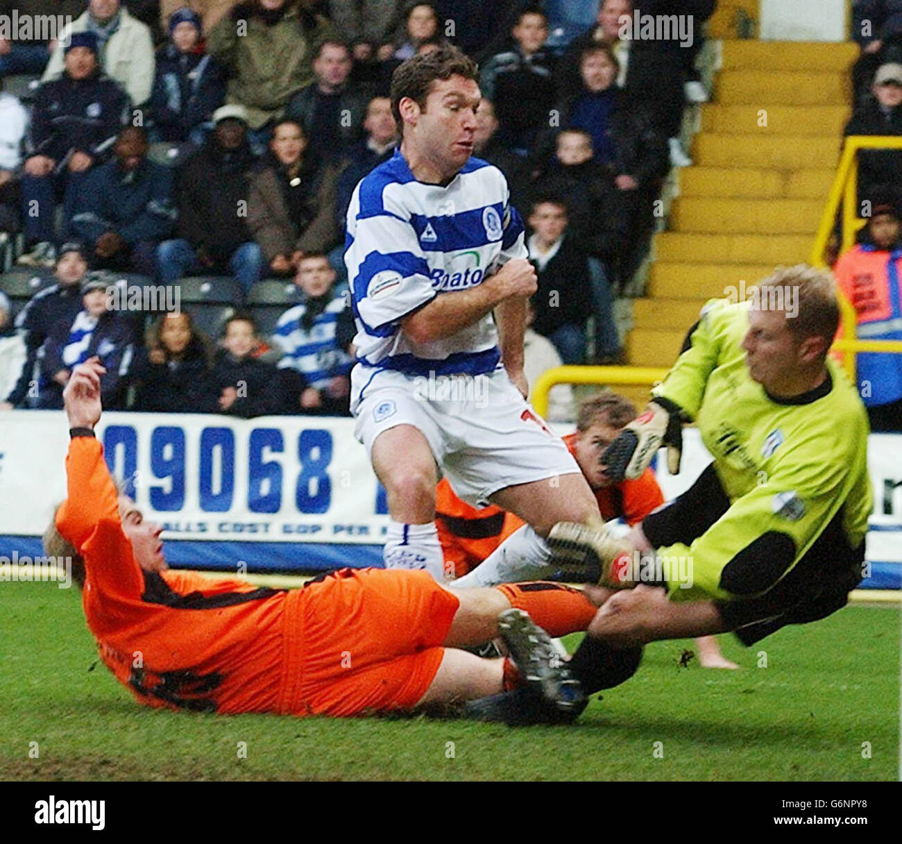 Queen Park Ranger's Kevin Gallen squeezes his side's first half goal ...