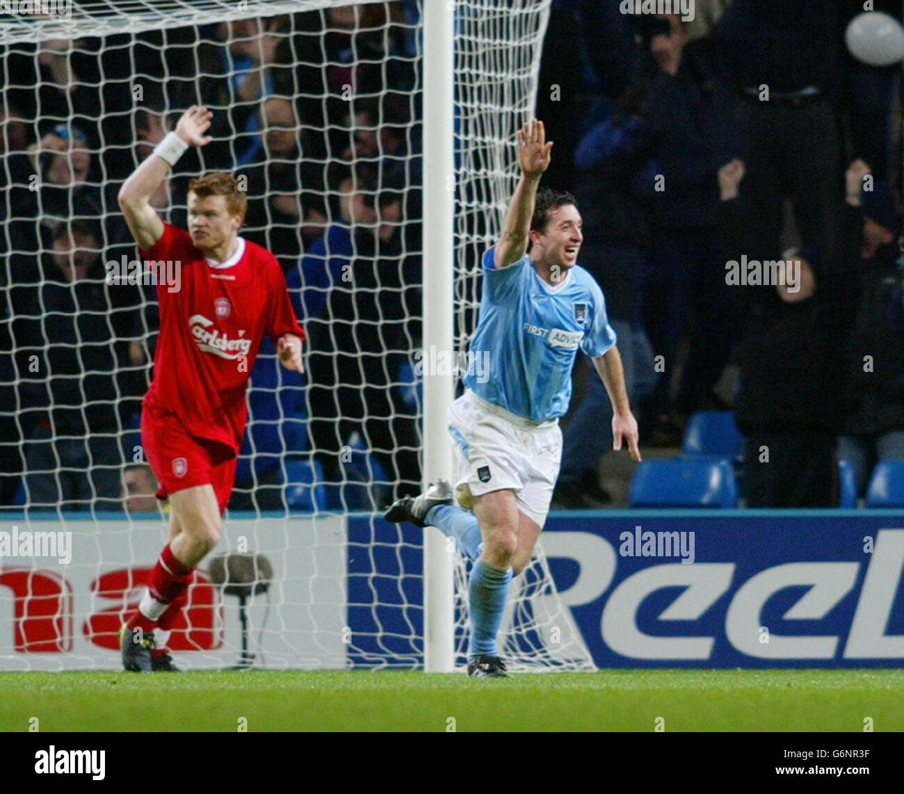 Manchester City's Robbie Fowler (R) celebrates after scoring against ...