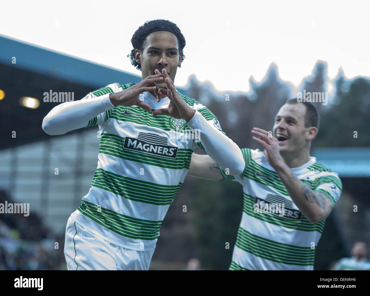 Celtics Virgil Van Dijk celebrates with Anthony Stokes (right) during ...