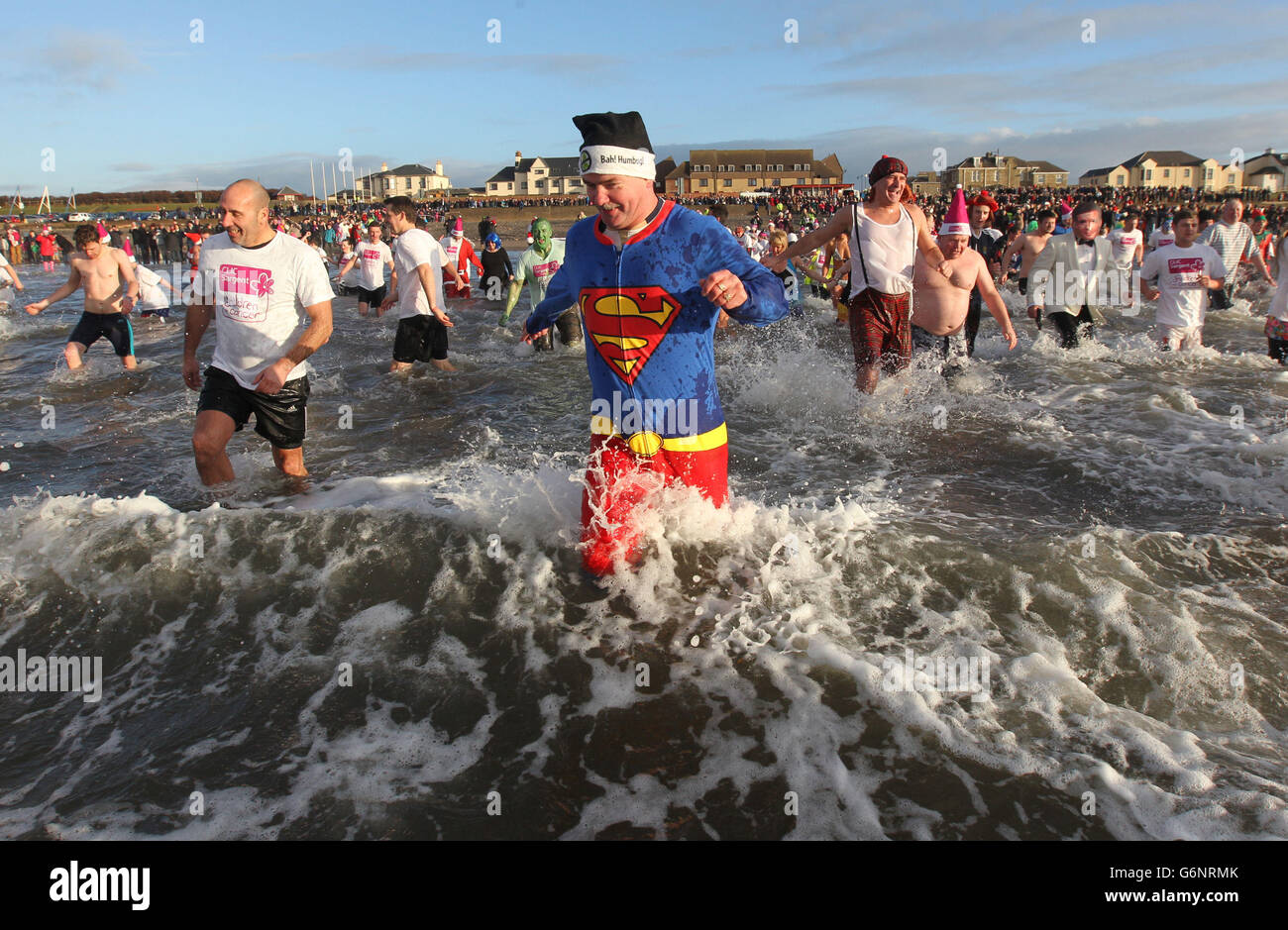 Charity swimmers take a dip in the sea at Prestwick Beach to raise ...