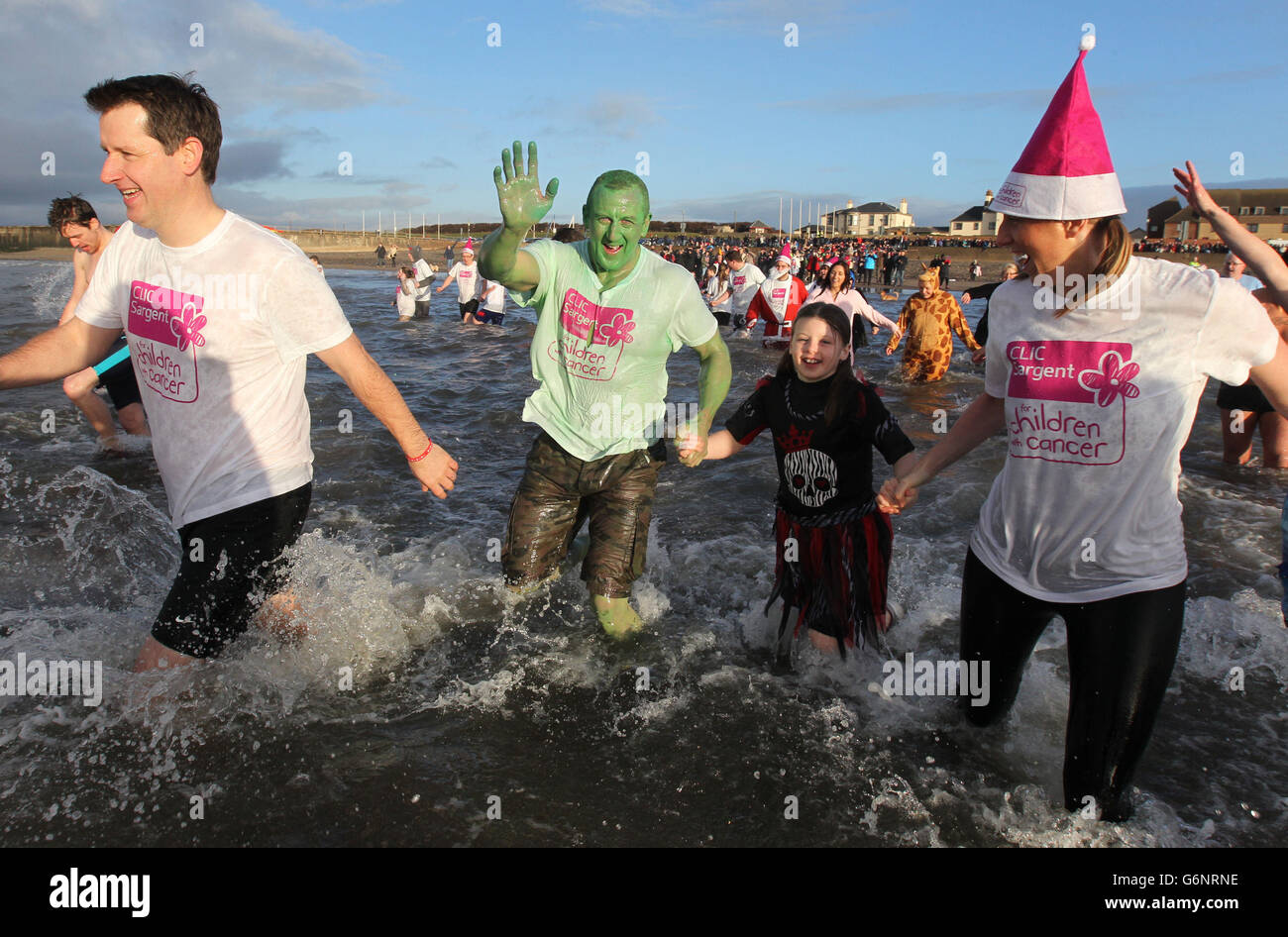 Charity swimmers take a dip in the sea at Prestwick Beach to raise ...
