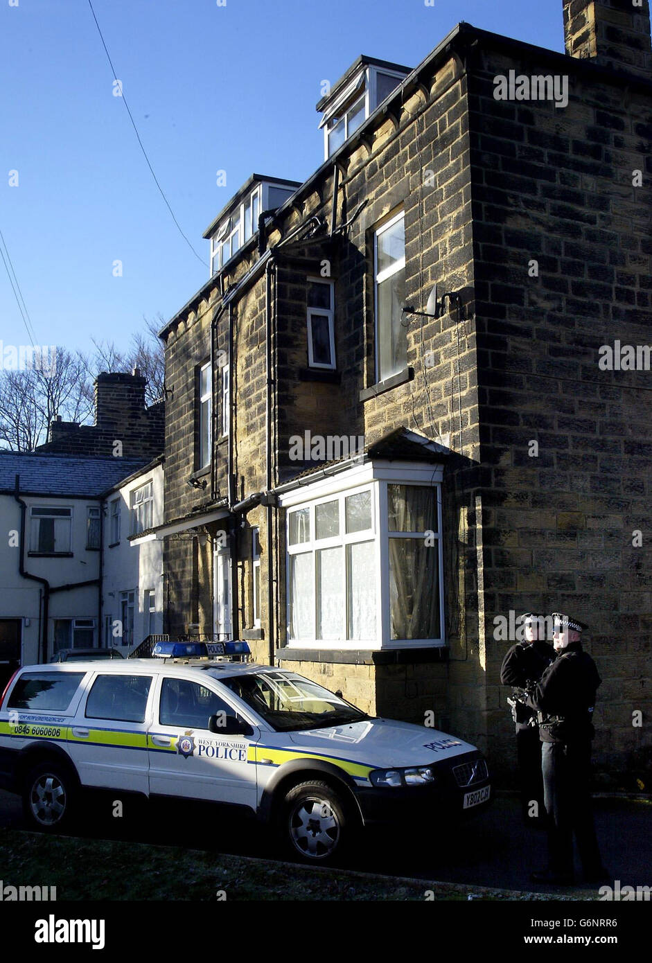 Police stand outside a property on springwood grove hi-res stock ...