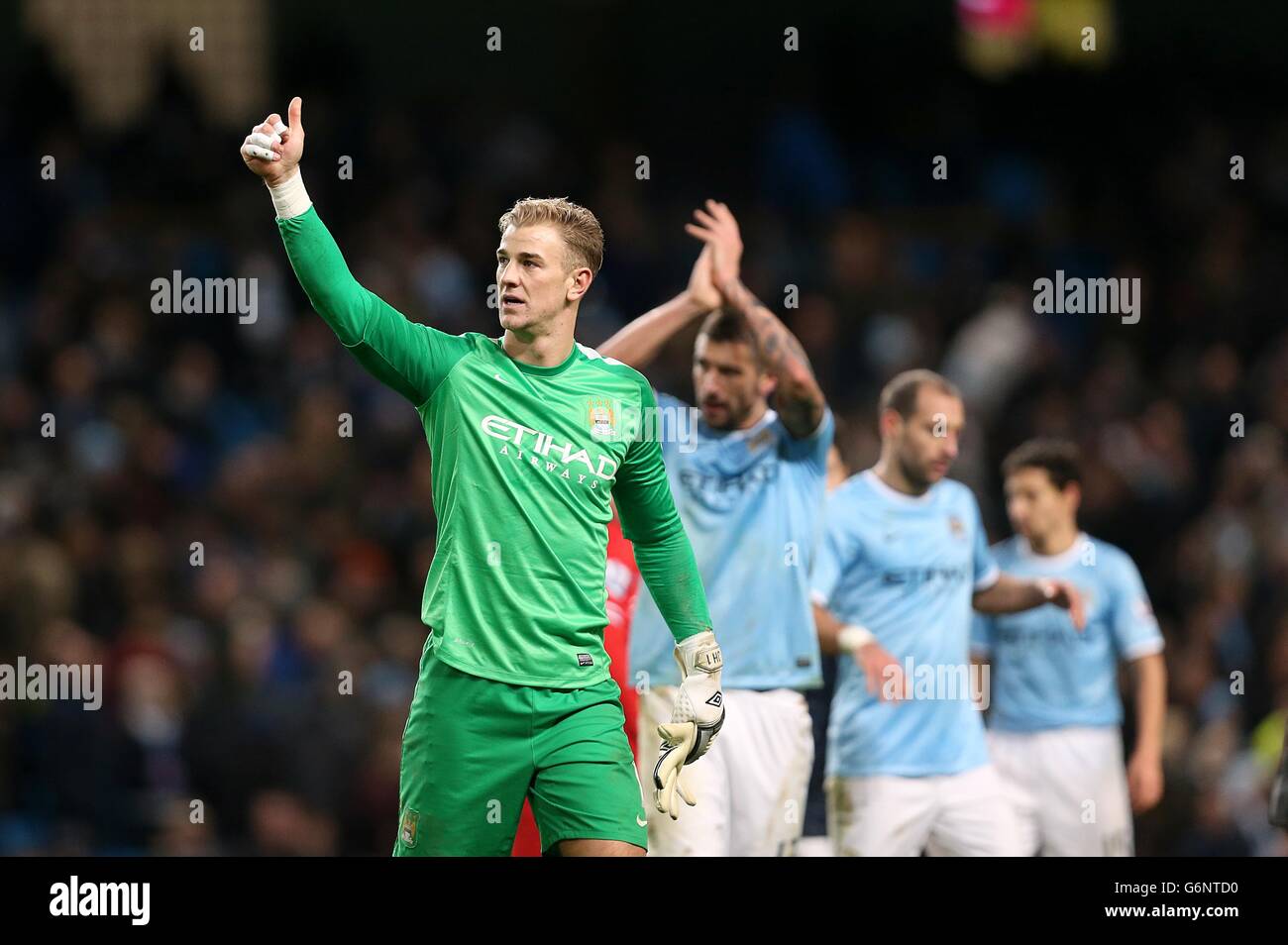 Manchester City goalkeeper Joe Hart with a thumbs up to the fans as ...