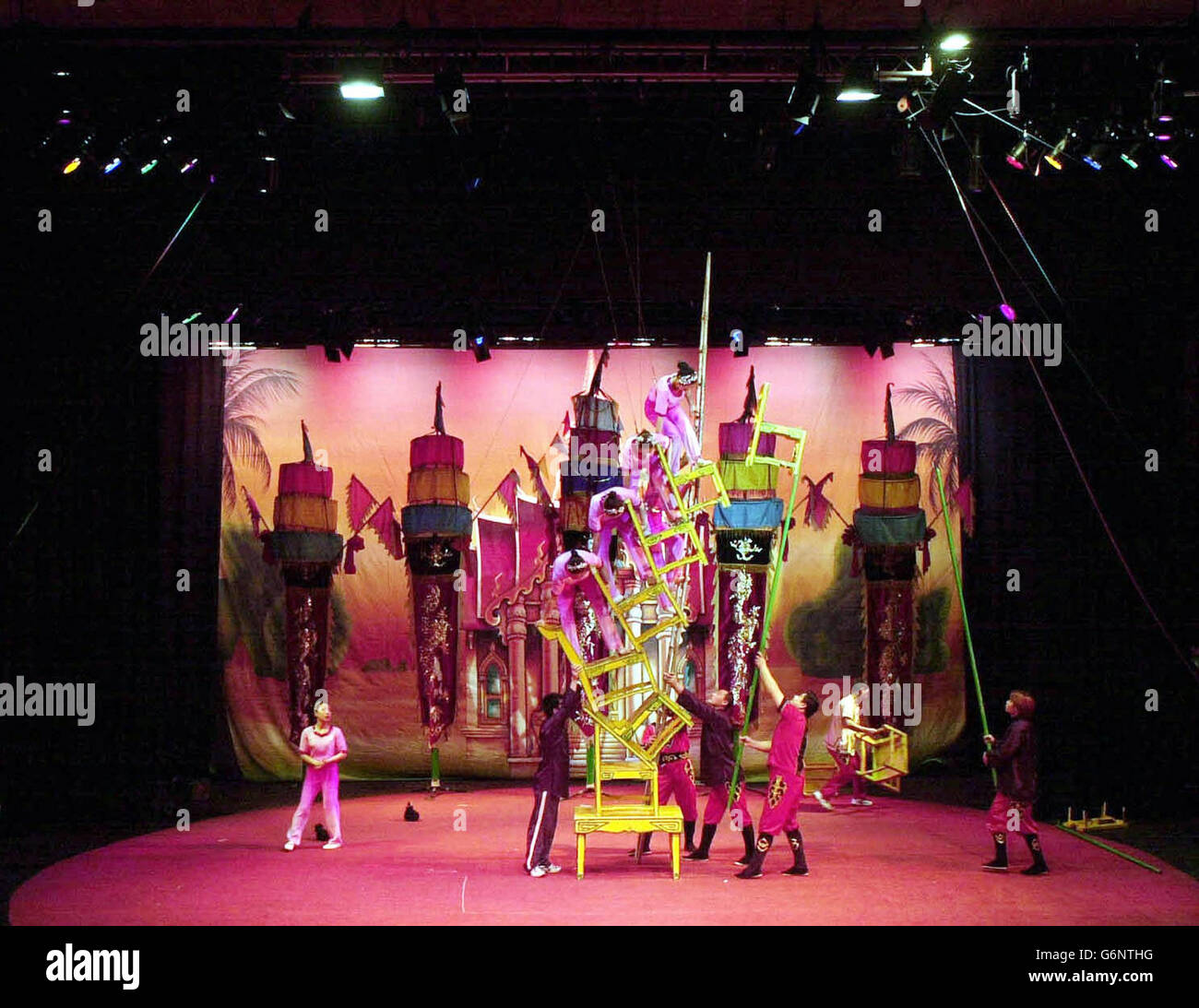 Circus performers show off their unique chair balancing routine during ...