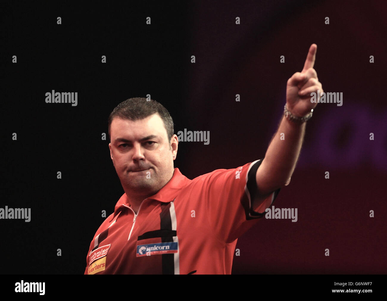 Wes Newton celebrates taking the set during his match against Peter ...